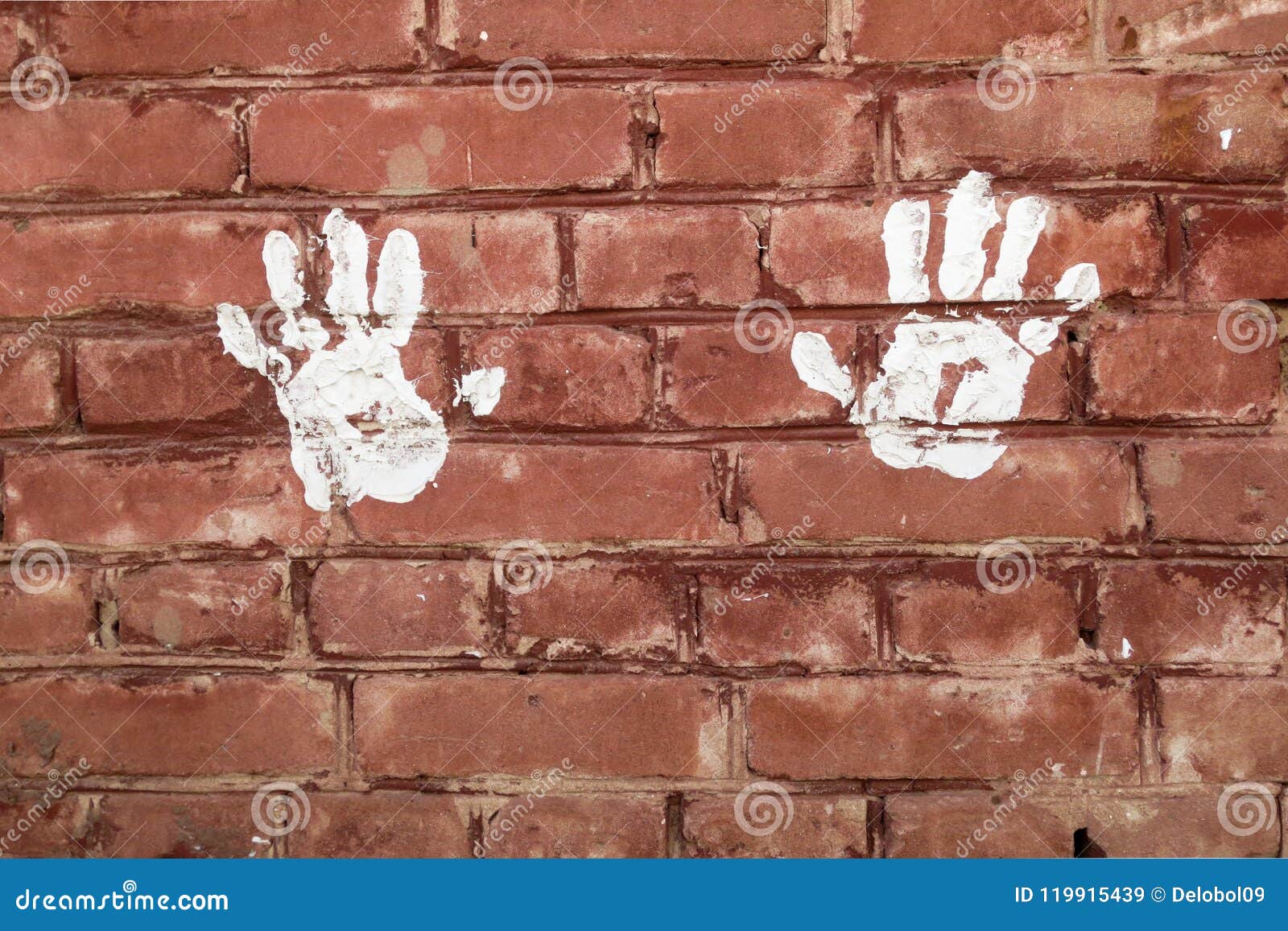 White Prints of the Palms of the Hands on the Brick Wall Stock Image ...