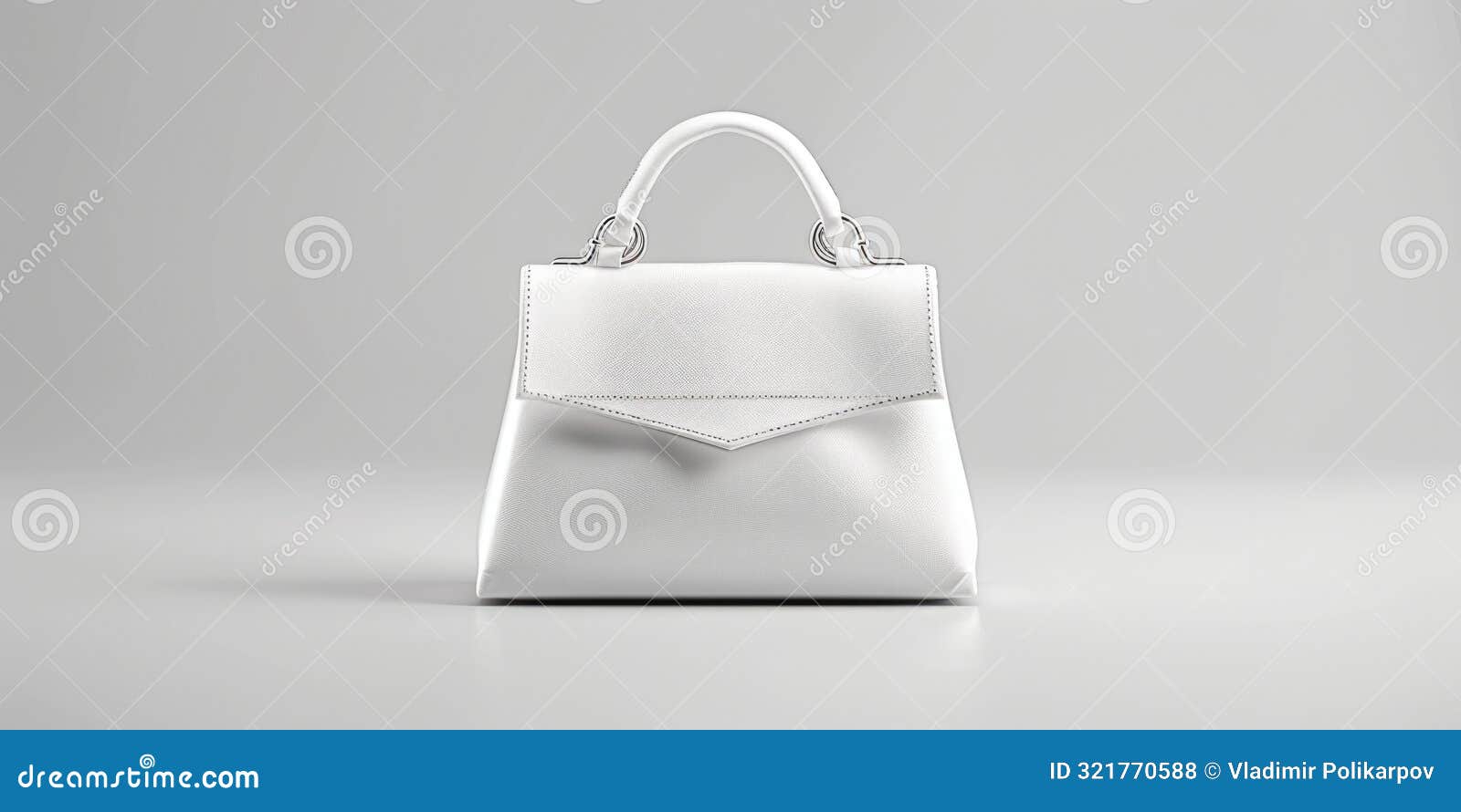 A White Purse Sits on Top of a Table, Ready To Be Grabbed Stock ...