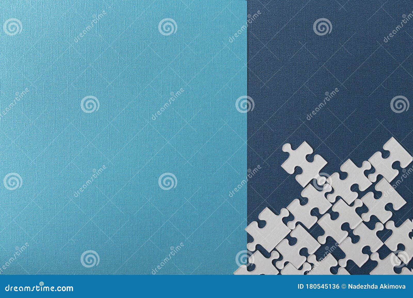 White Puzzle Pieces on Textured Backdrop. Two Shades of Blue Stock ...