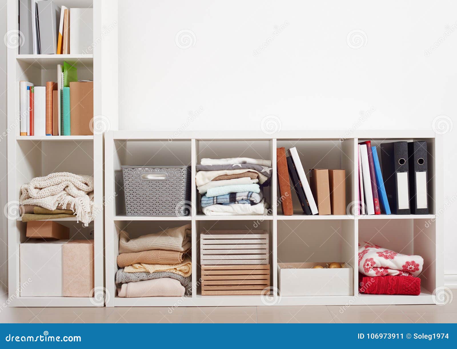 White Rack with Shelves Full of Stuff Stock Image - Image of paper ...