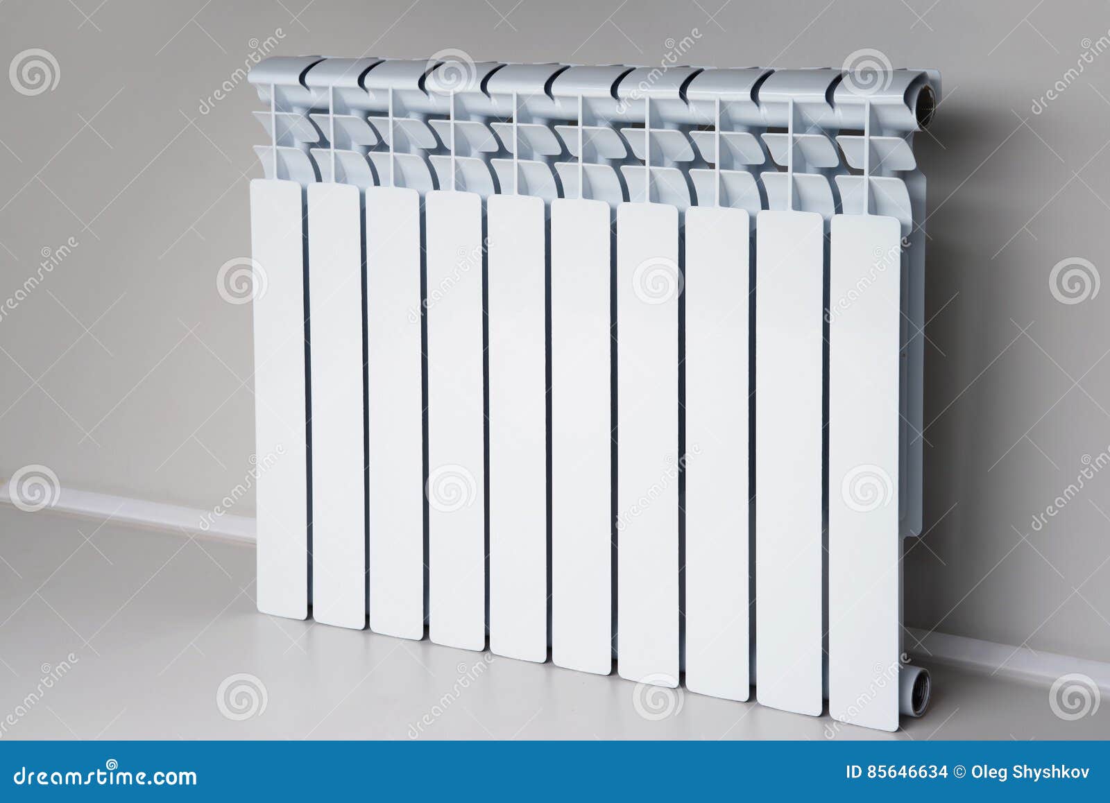 White Radiator in an Apartment Stock Photo - Image of pipe, floor: 85646634