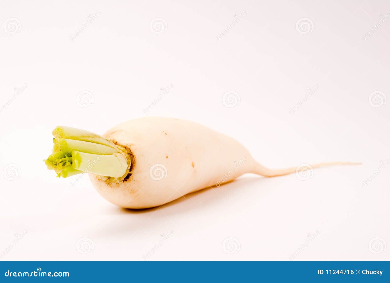 White Radish Background With Roots On The Table In Light And Shade ...