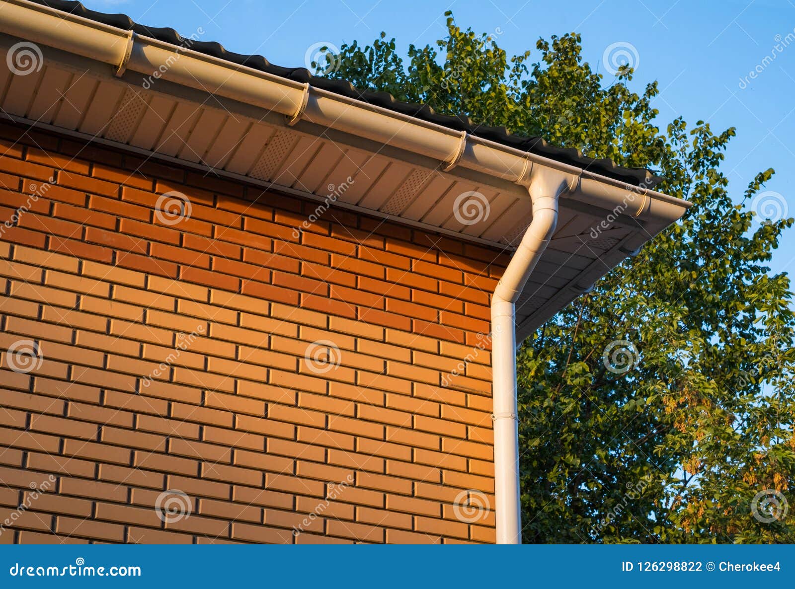 White Rain Gutter on the Roof the Brick Building Stock Photo - Image of ...
