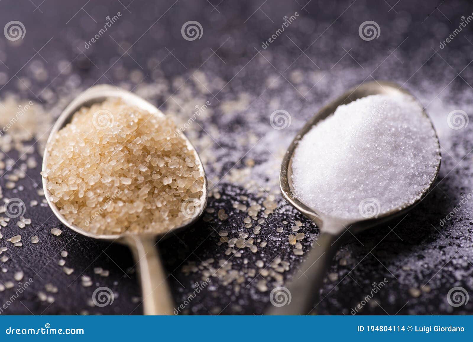 White and raw cane sugar stock photo. Image of brown - 194804114