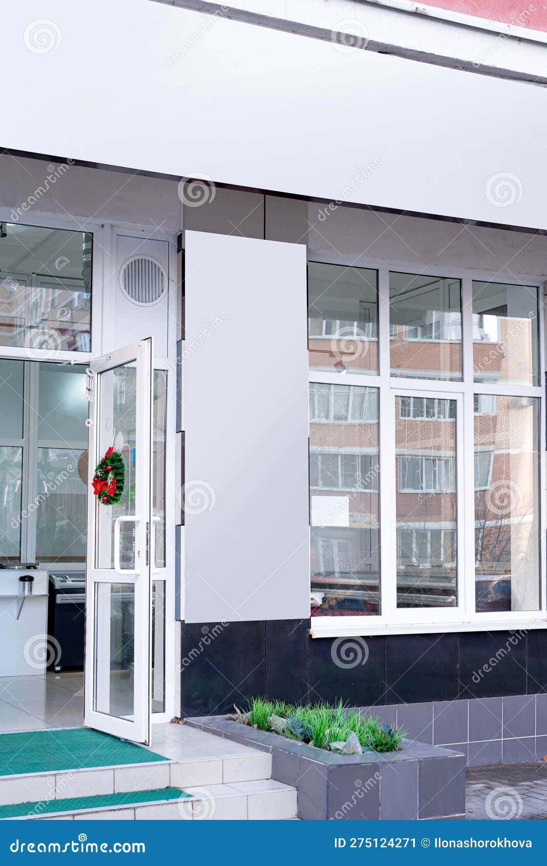 White Rectangle Logo on Wall with Windows ,exterior for Mockup Design ...