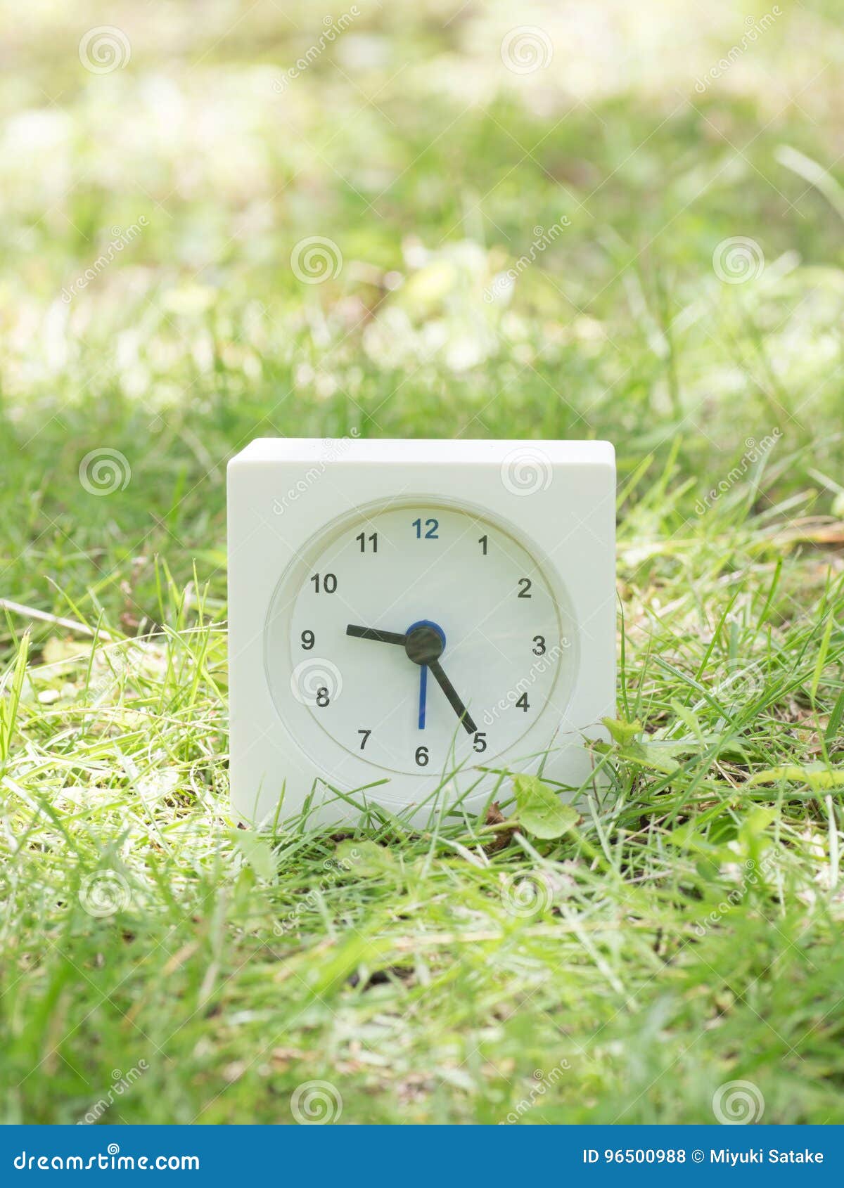 White Simple Clock on Lawn Yard, 9:25 Nine Twenty Five Stock Photo ...