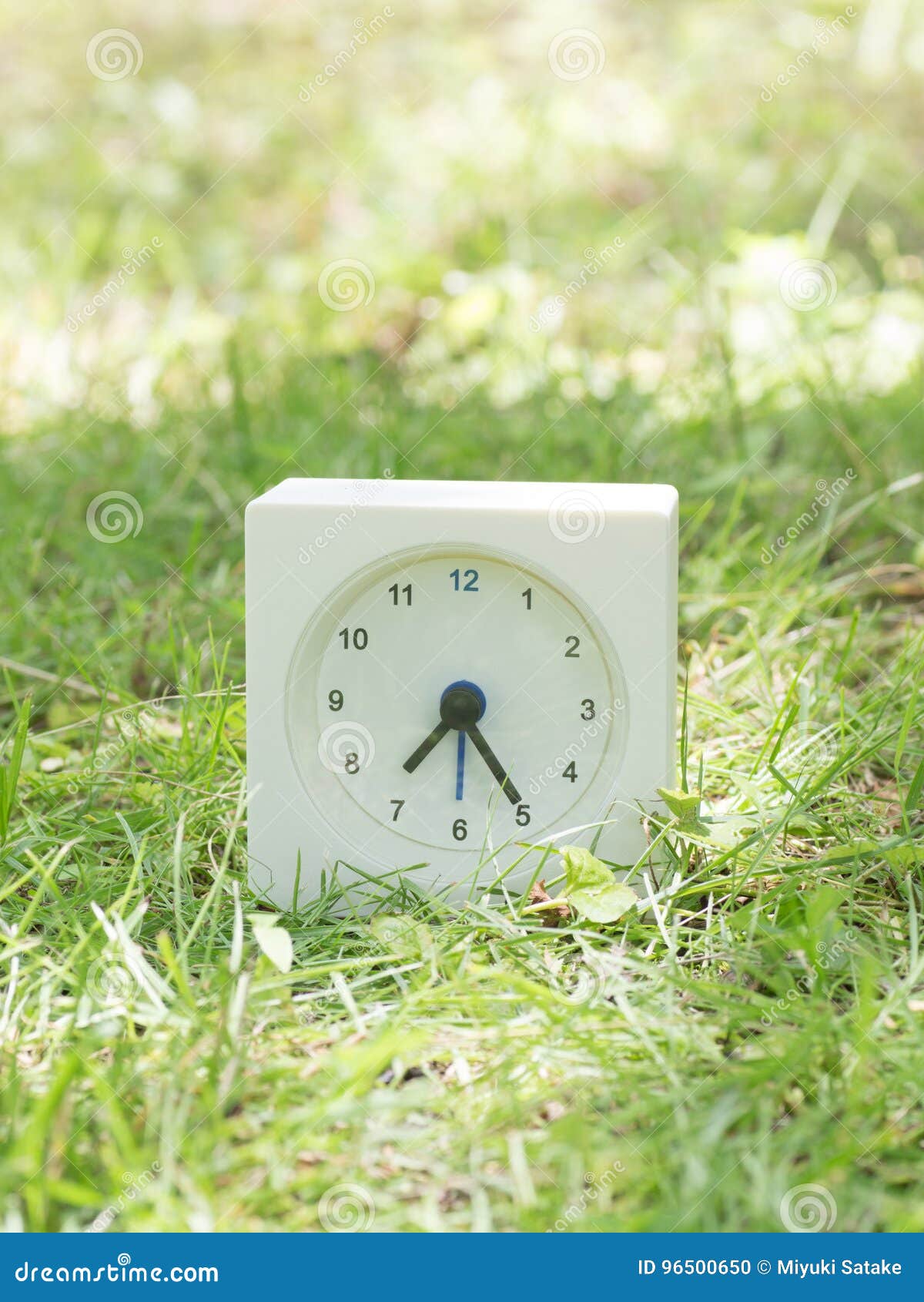 White Simple Clock on Lawn Yard, 7:25 Seven Twenty Five Stock Photo ...