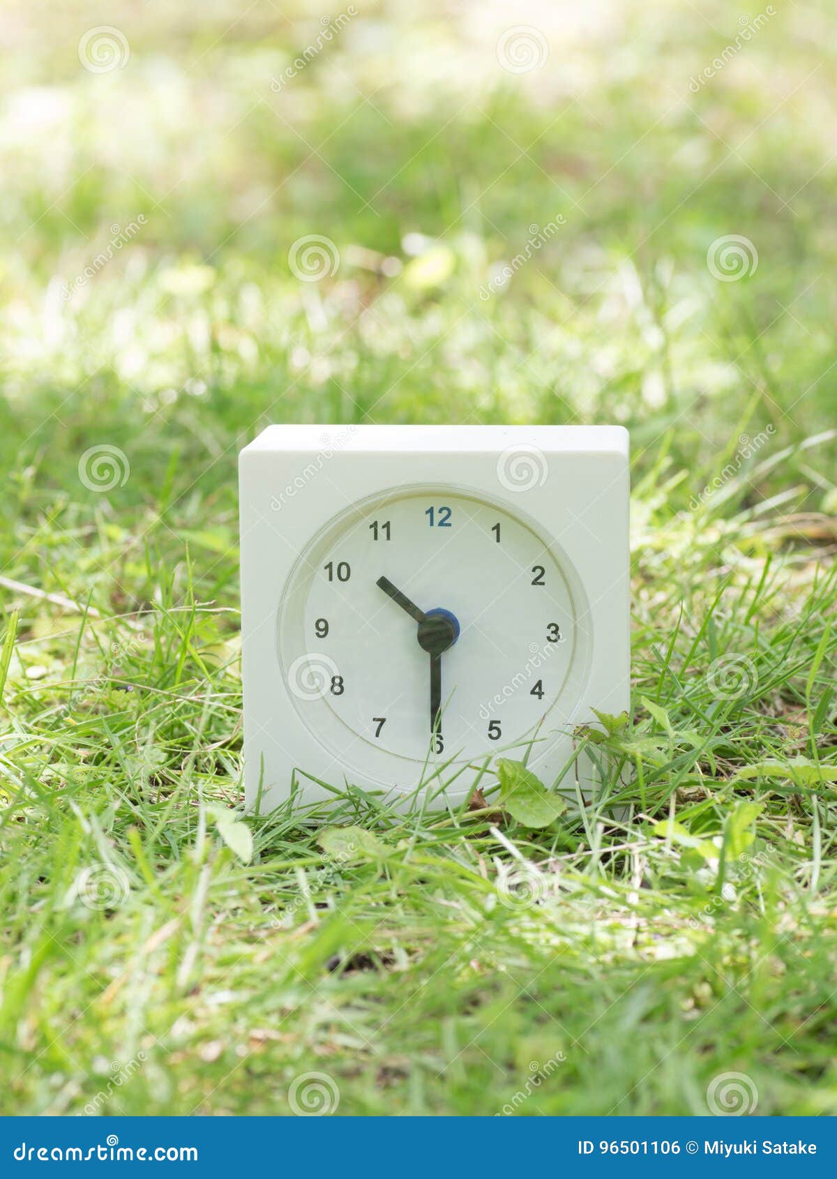 White Simple Clock on Lawn Yard, 10:30 Ten Thirty Half Stock Photo ...