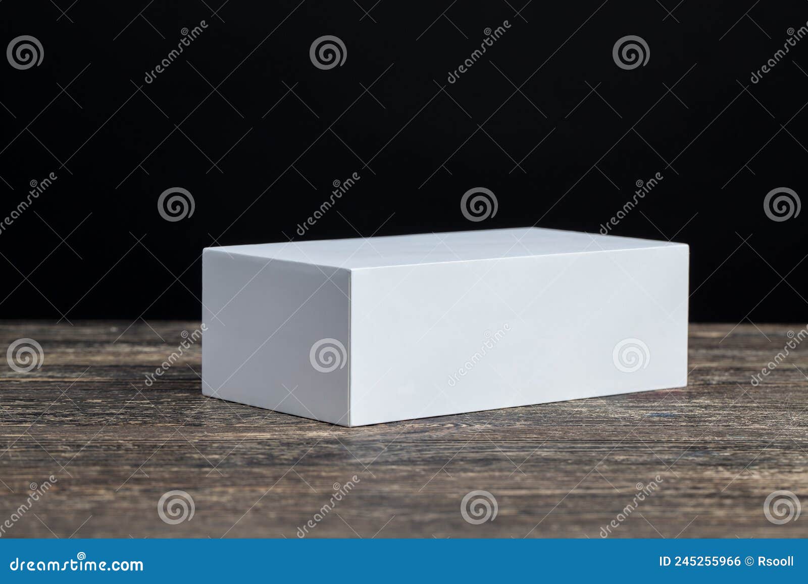 A White Rectangular Box on a Black Board Stock Photo - Image of board ...