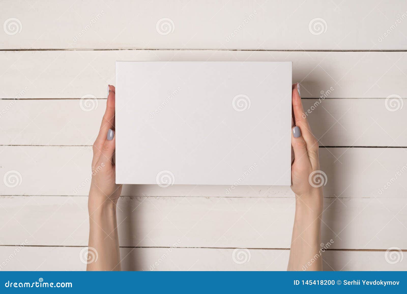 White Rectangular Box in Female Hands. Top View Stock Photo - Image of ...