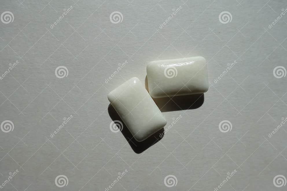 2 White Pieces of Chewing Gum from Above Stock Photo - Image of mouth ...