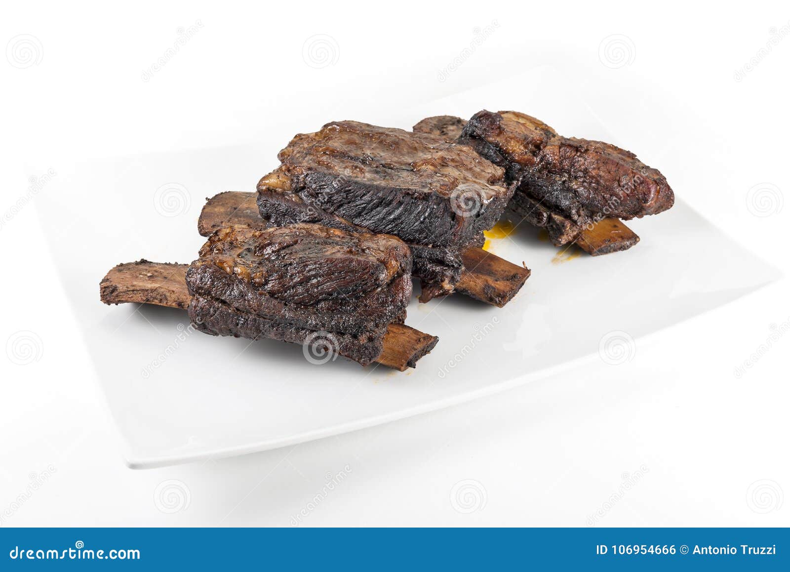 White Rectangular Plate with Three Cooked Beef Ribs Stock Photo - Image ...