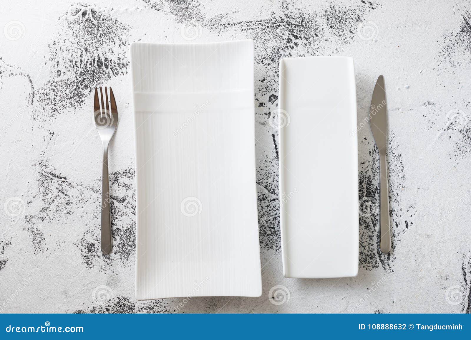 White Rectangular Plates with Fork and Knife on White Wooden Background ...