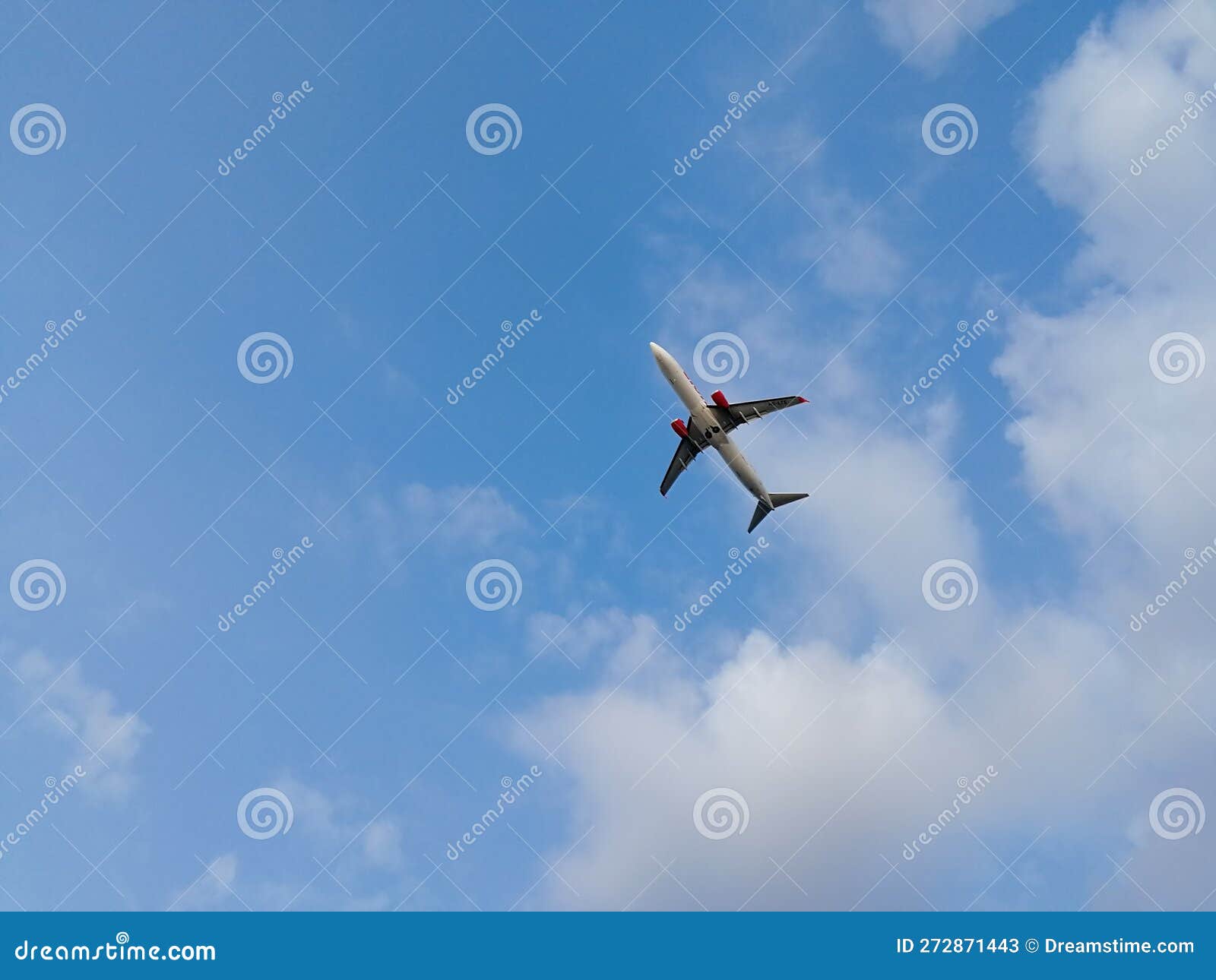 Airplane in the blue sky stock image. Image of airplane - 272871443