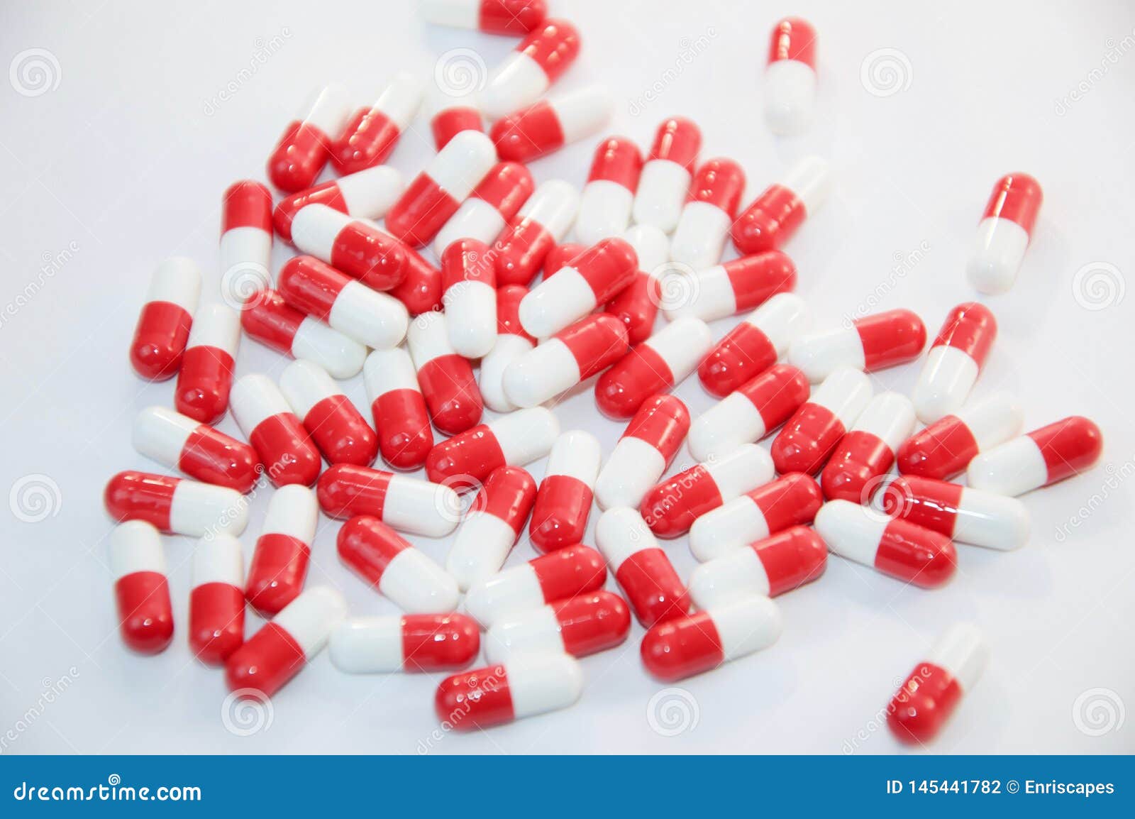 White and red capsules stock photo. Image of dropping - 145441782