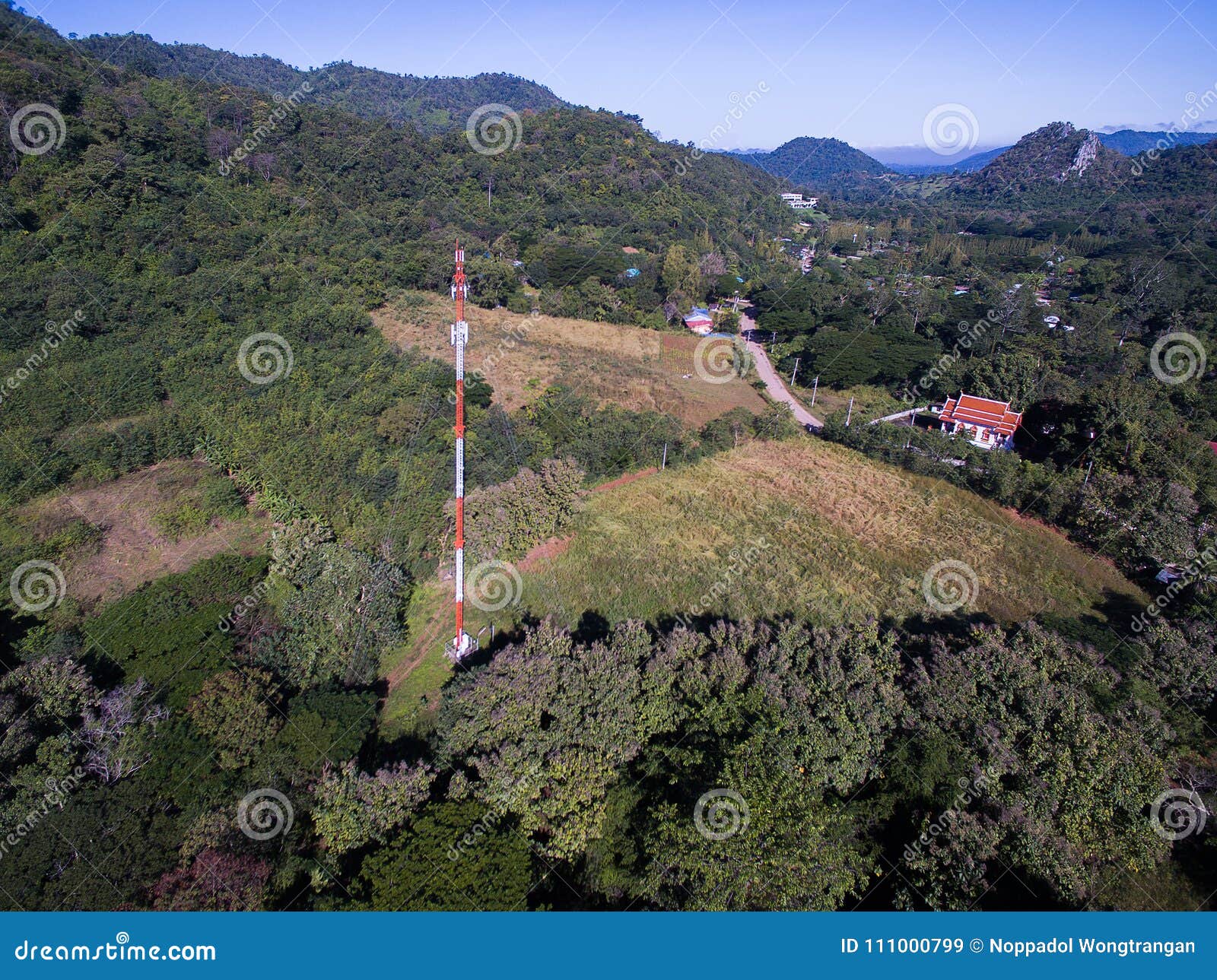 White and Red Cell Tower in Village on Mountain Stock Image - Image of ...