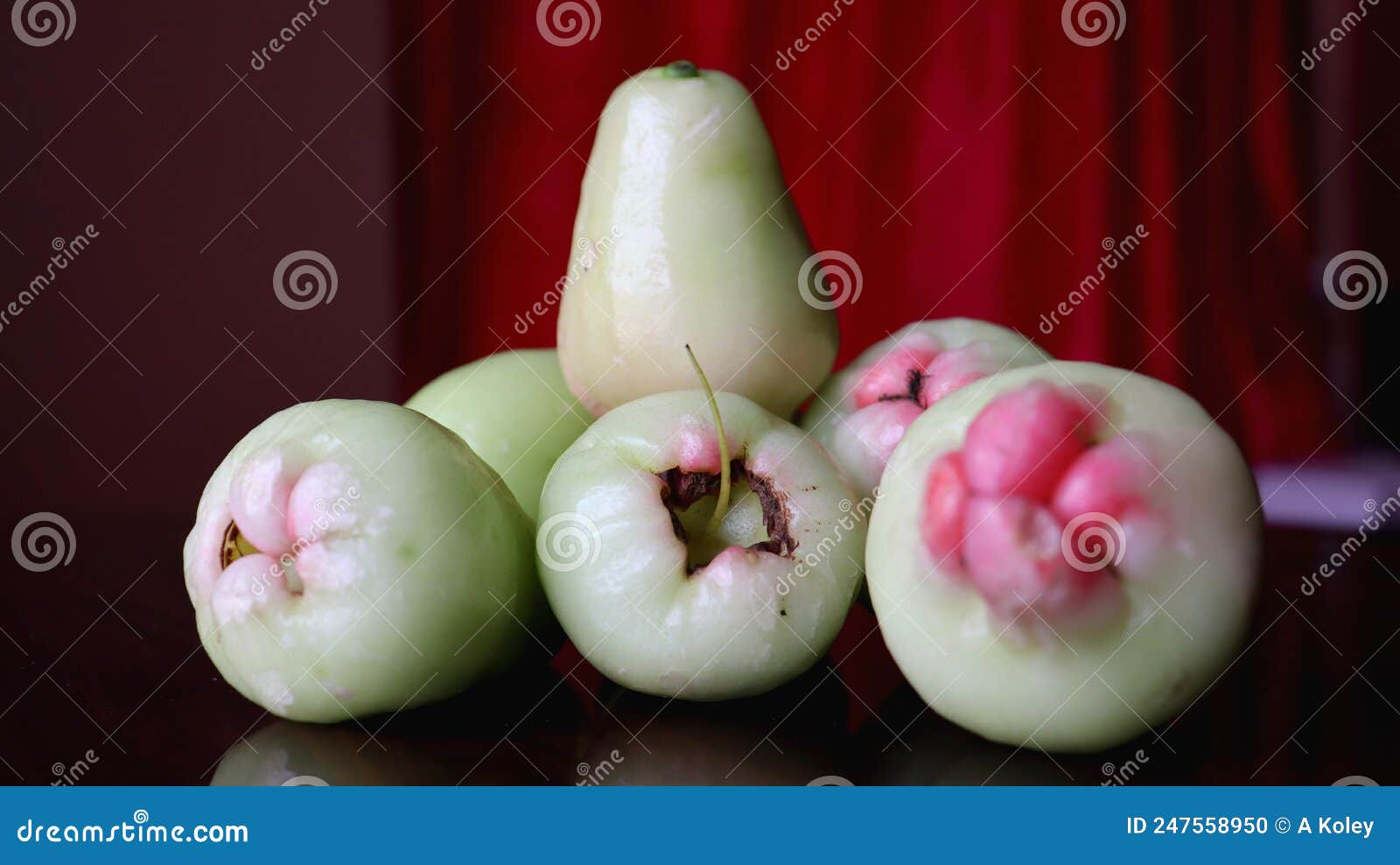 White and Red Jamrul on a Reflective Surface,summer Fruit Full of ...