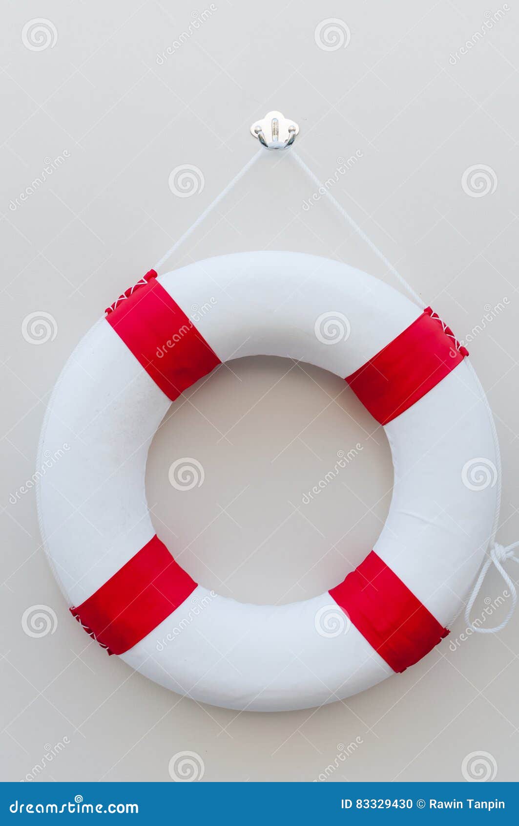 A White Red Lifebuoy with a Board on White Wall Stock Photo - Image of ...