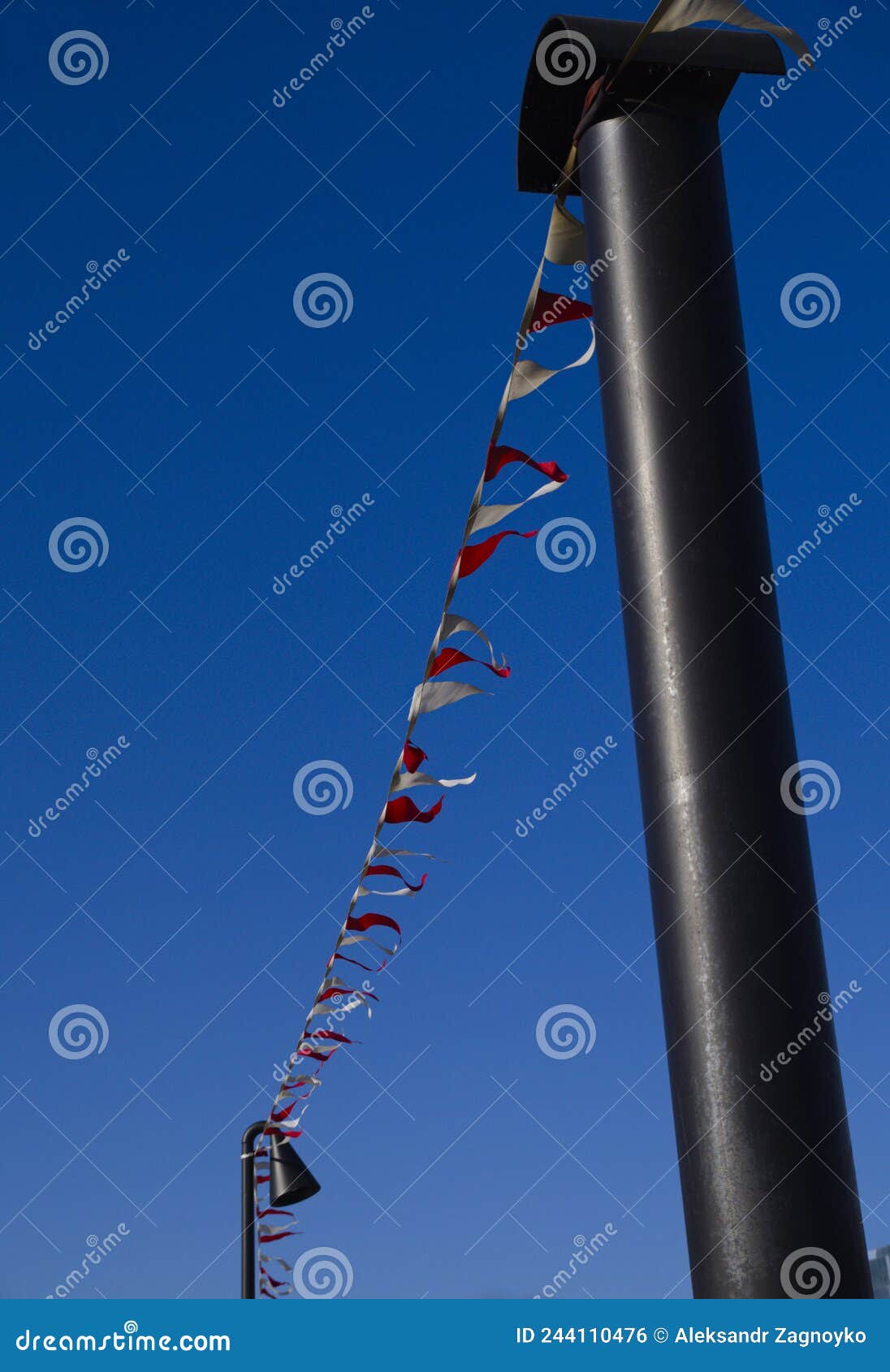 White and Red Triangular Signal Flags on a Blue Sky Background. Stock ...