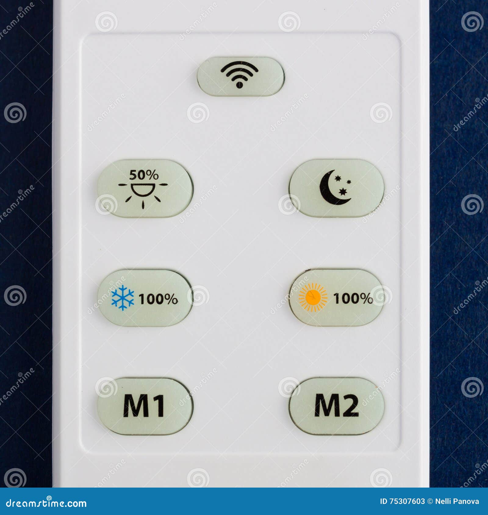 White Remote Control with the Buttons on the Blue Background Stock ...