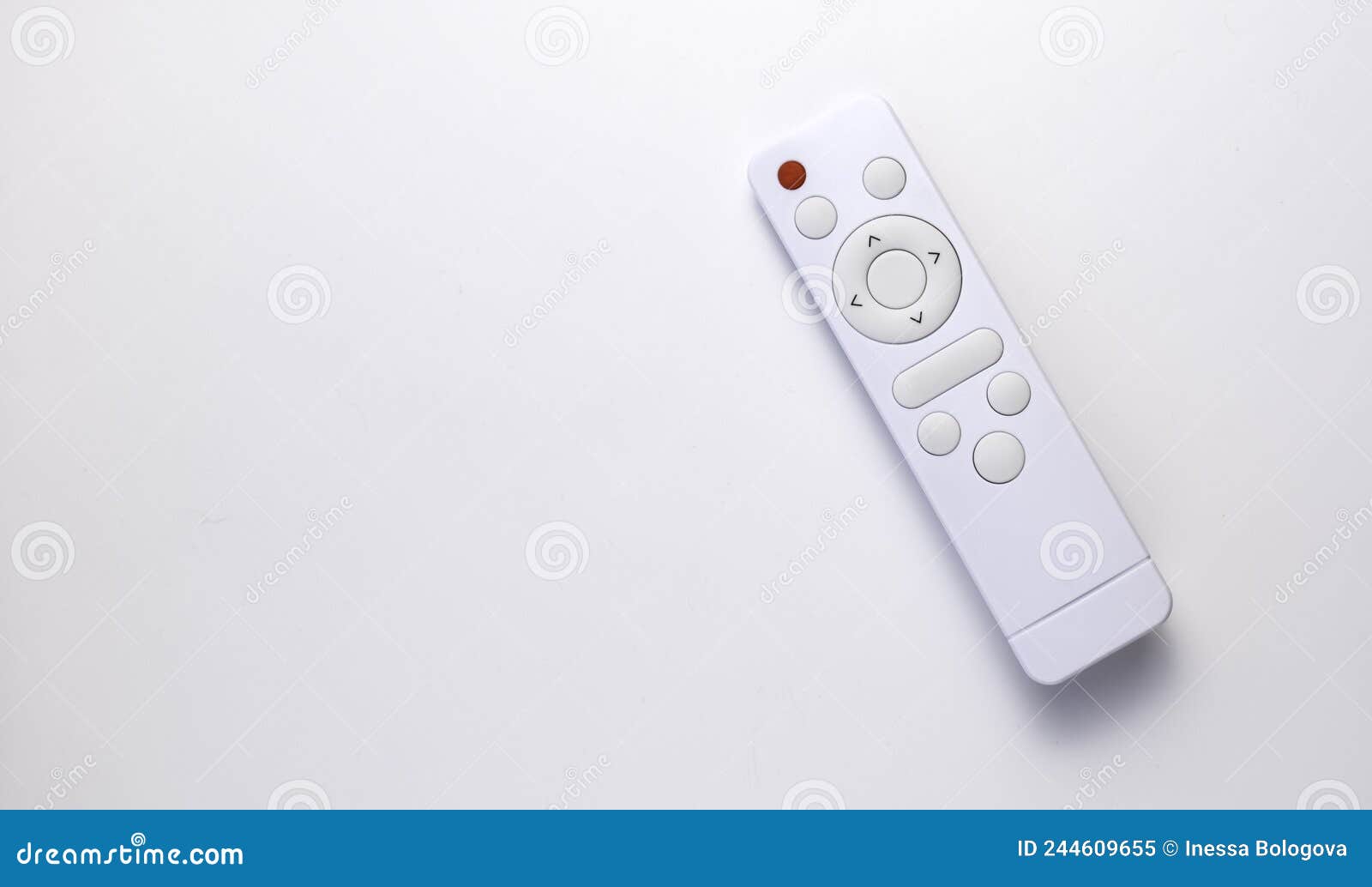 White Remote Control on a White Background. Layout with Copy Space ...