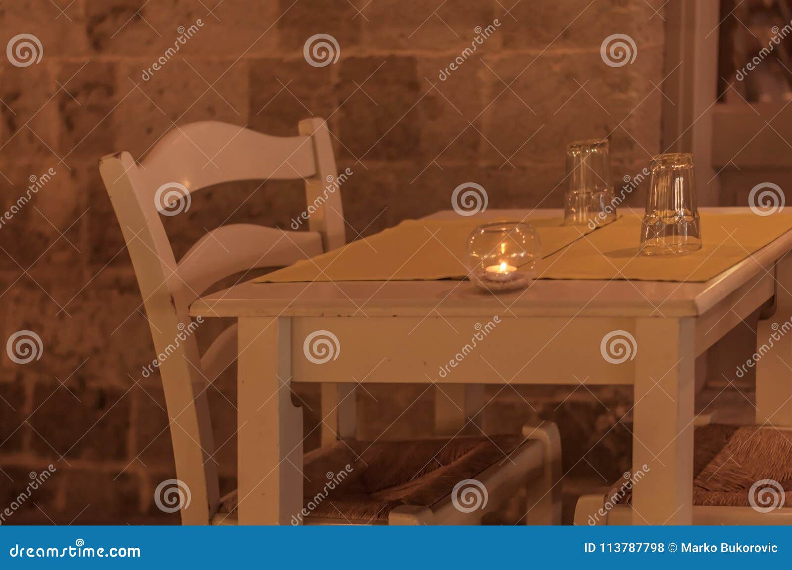 White Restaurant Table with Candle Outside on Terrace Stock Photo ...