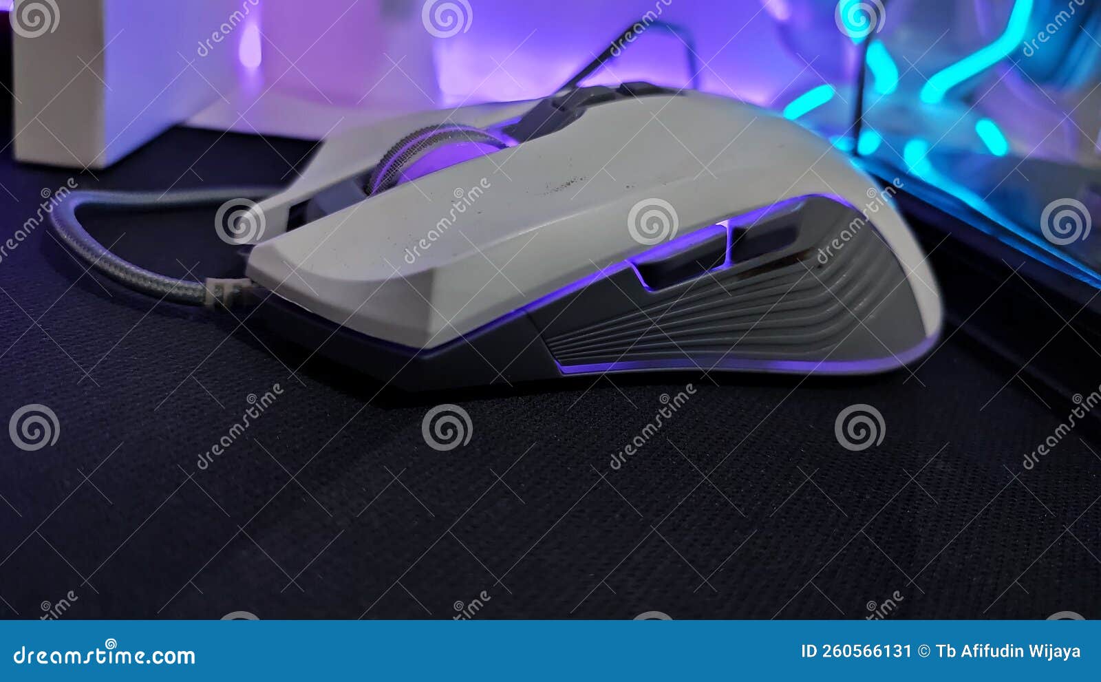 White RGB Gaming Mouse with Gray Cable in Use Stock Image - Image of ...