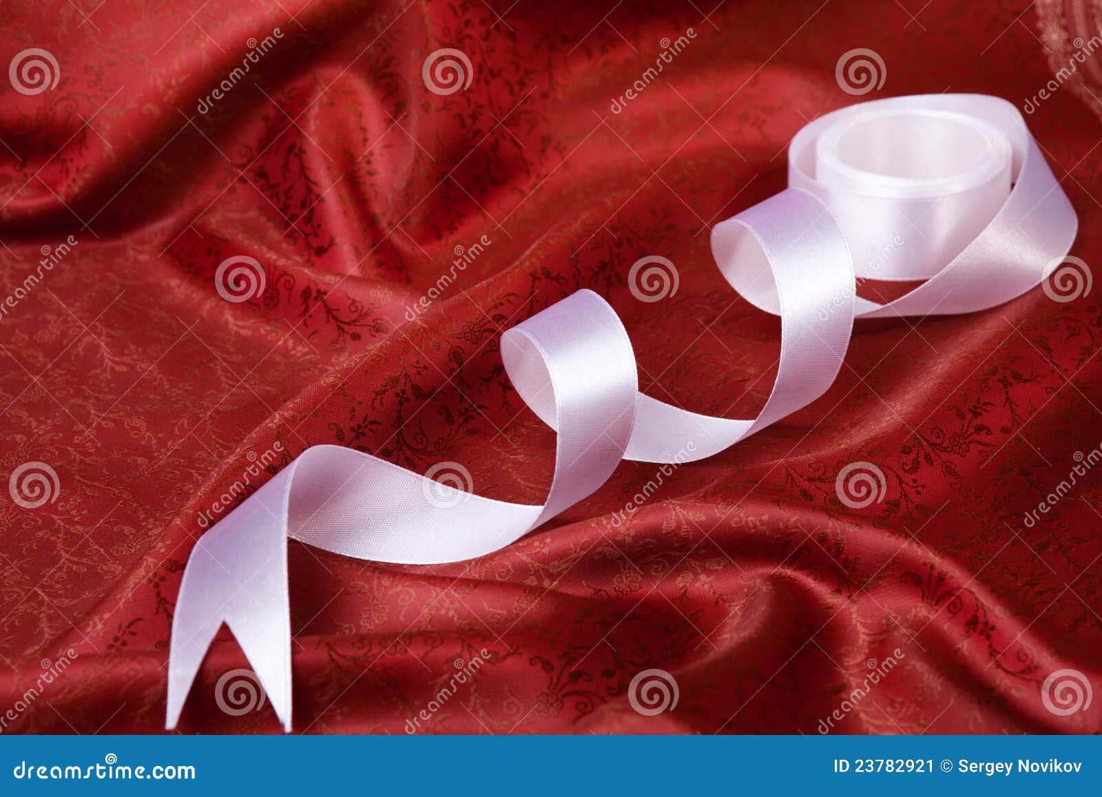 White ribbon on red drape stock image. Image of ornament - 23782921