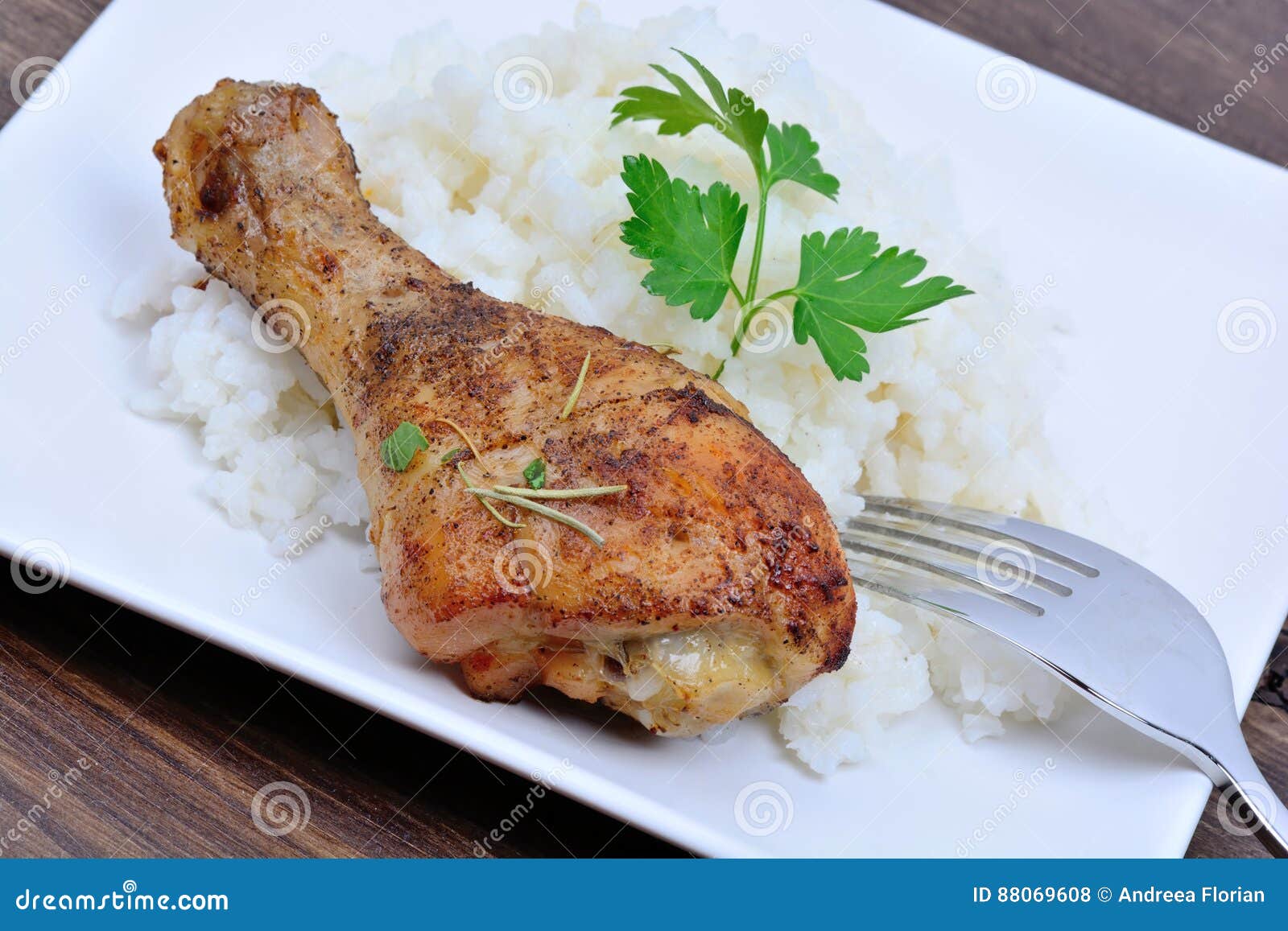 White Rice with Chicken Leg in a Plate on Table Stock Photo - Image of ...