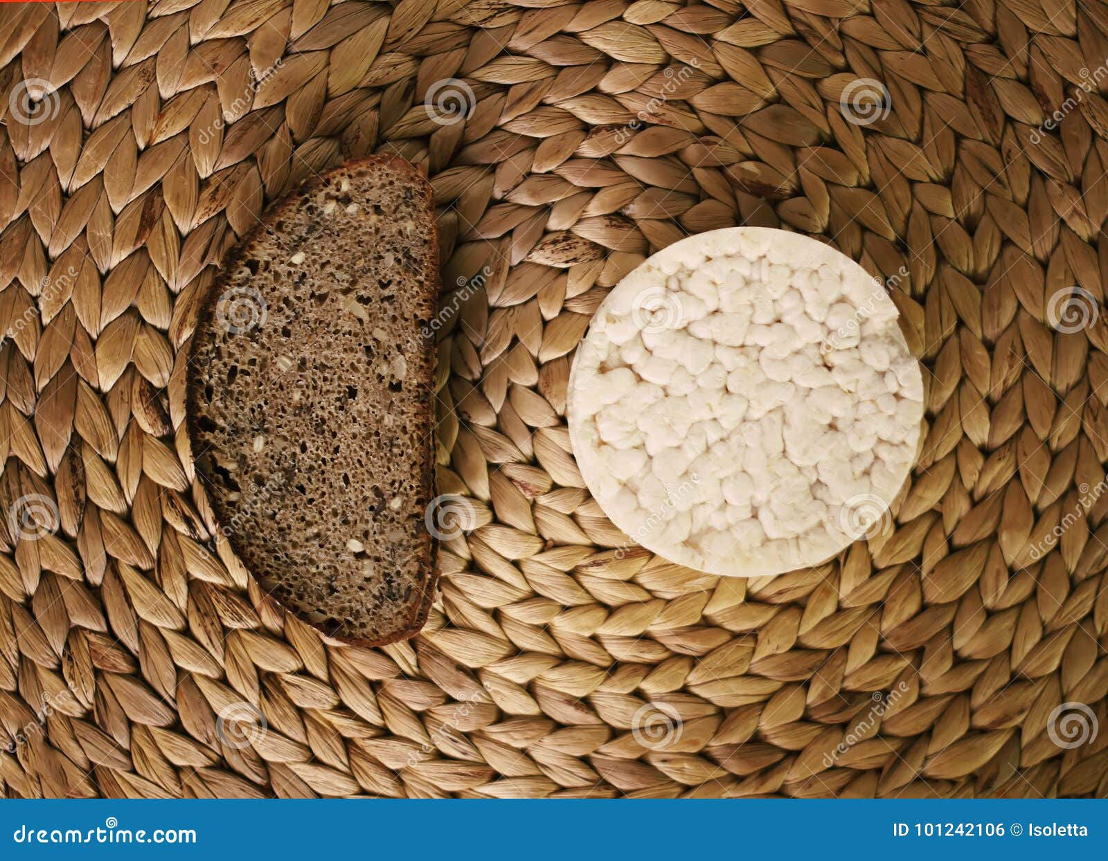 White Rice Crackers and Bread on Whicker Place Mat. Stock Photo - Image ...