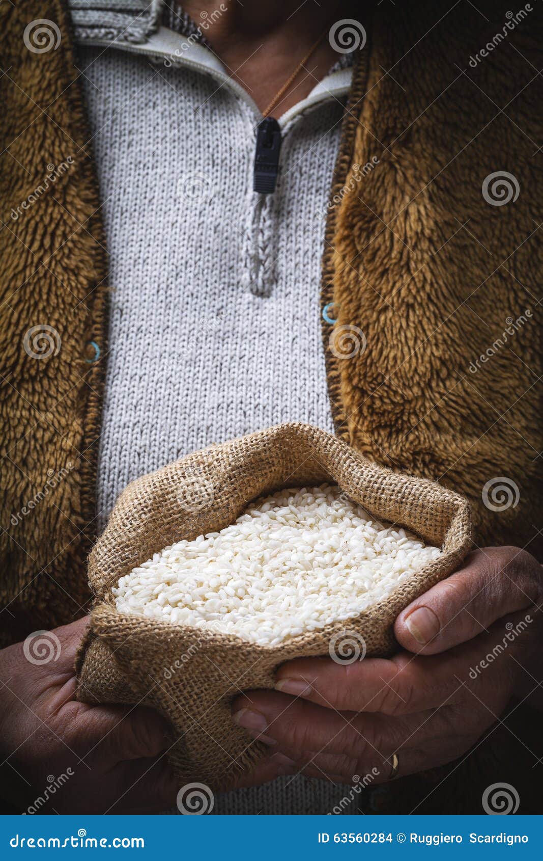 White rice in old hand stock photo. Image of hand, crop - 63560284