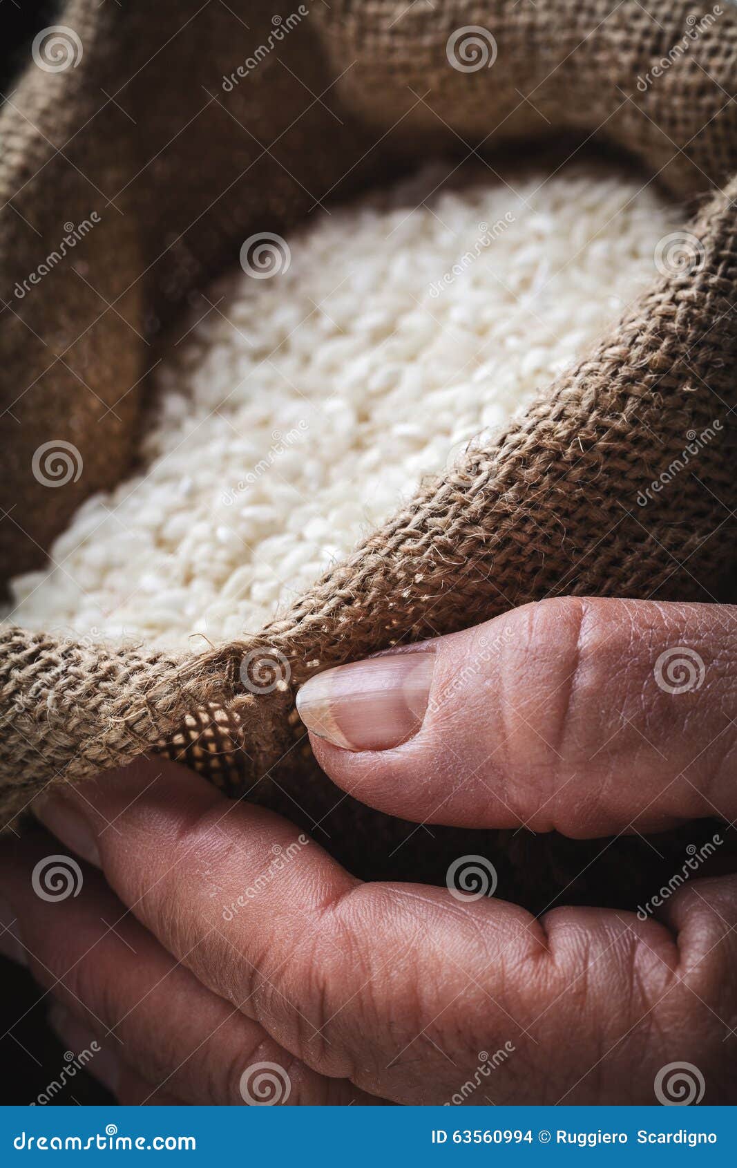 White rice in old hand stock photo. Image of millet, jute - 63560994