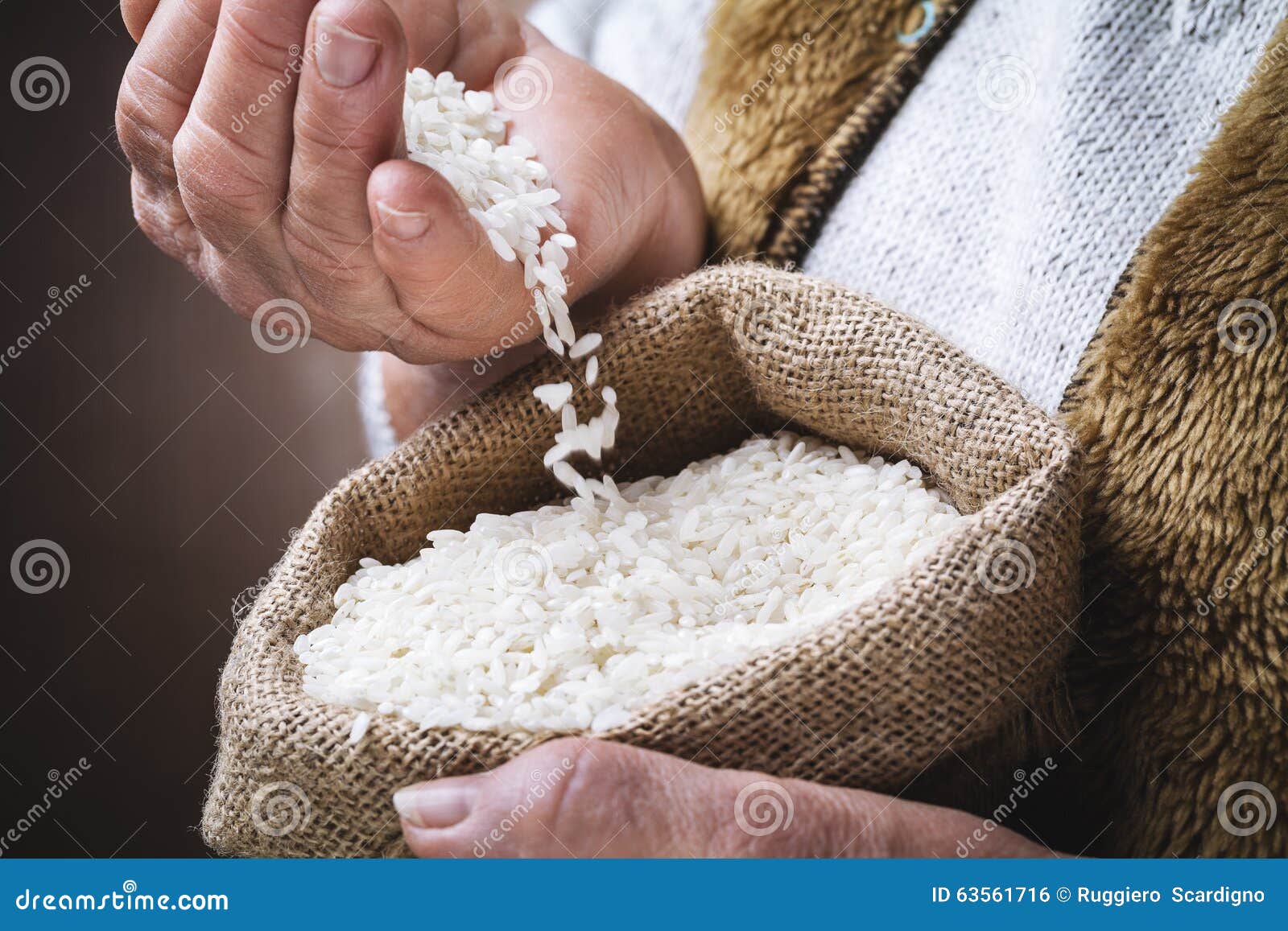 White rice in old hand stock photo. Image of food, cuisine - 63561716
