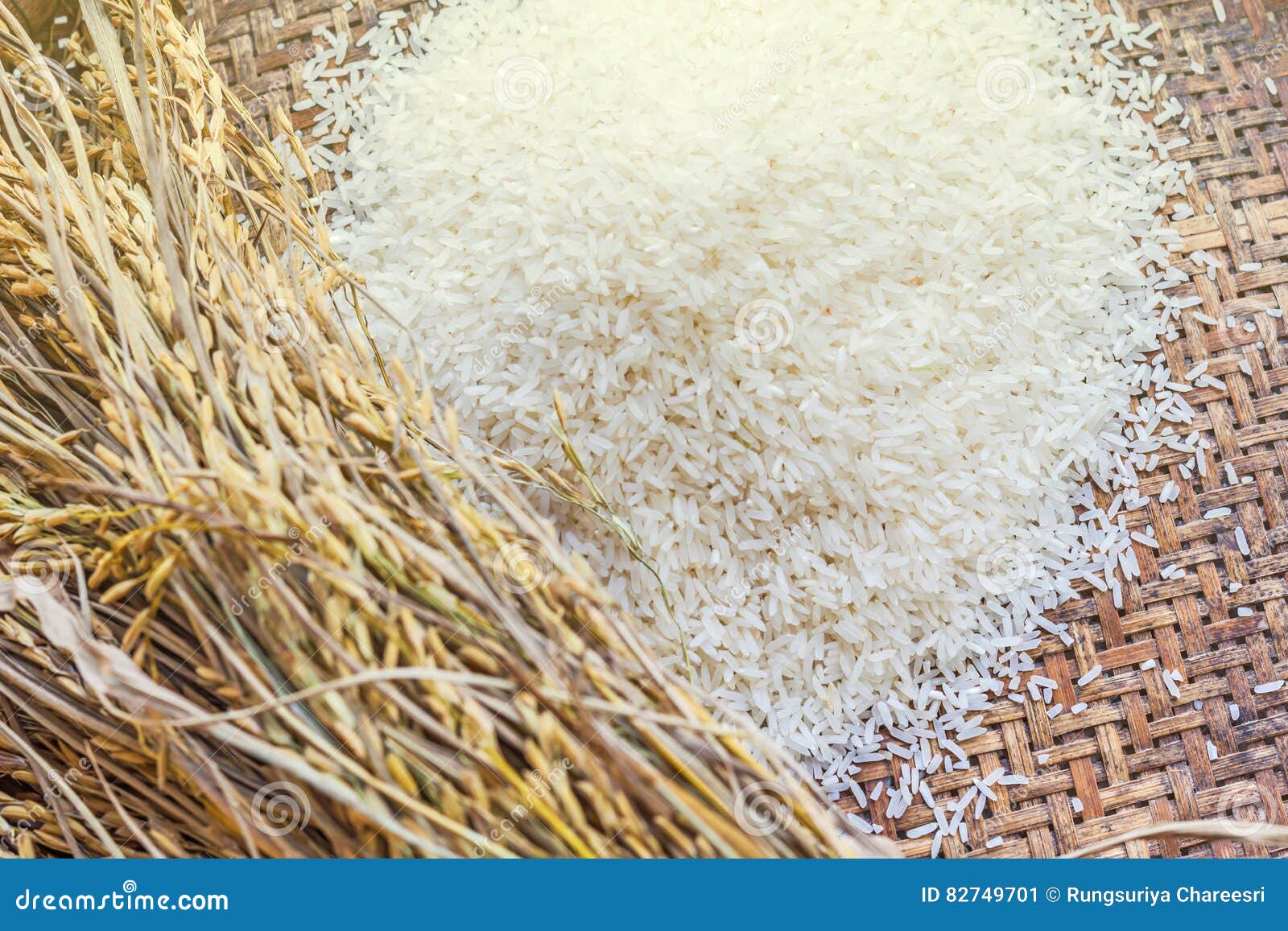 White Rice and Pile of Paddy on the Bamboo Plate. Stock Image - Image ...
