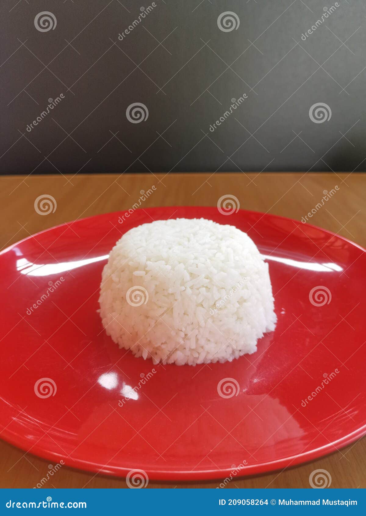 White Rice on a Red Plate with Black Background Stock Photo - Image of ...