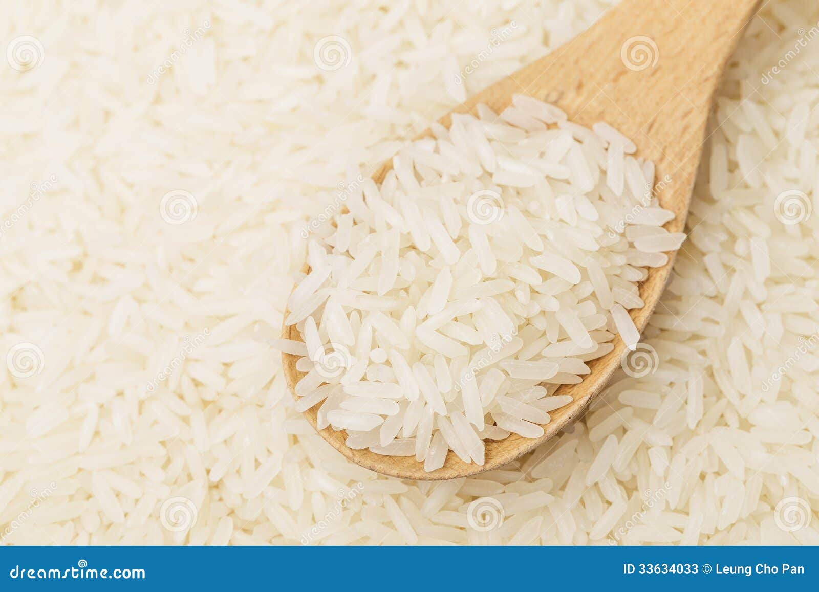 White rice on spoon stock image. Image of grain, rice - 33634033