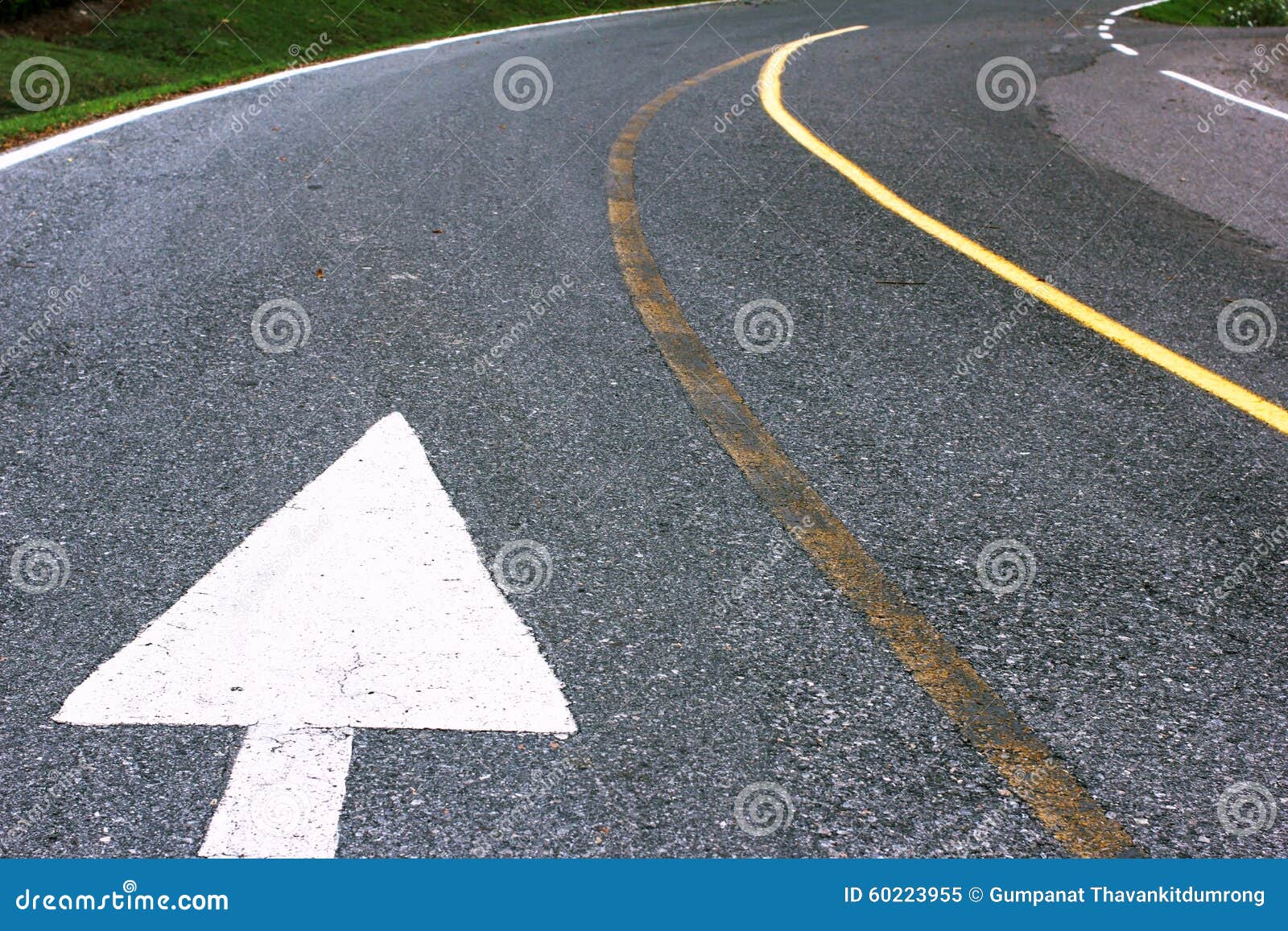 White Road Arrow Direction Sign on the Asphalt Road. Stock Image ...