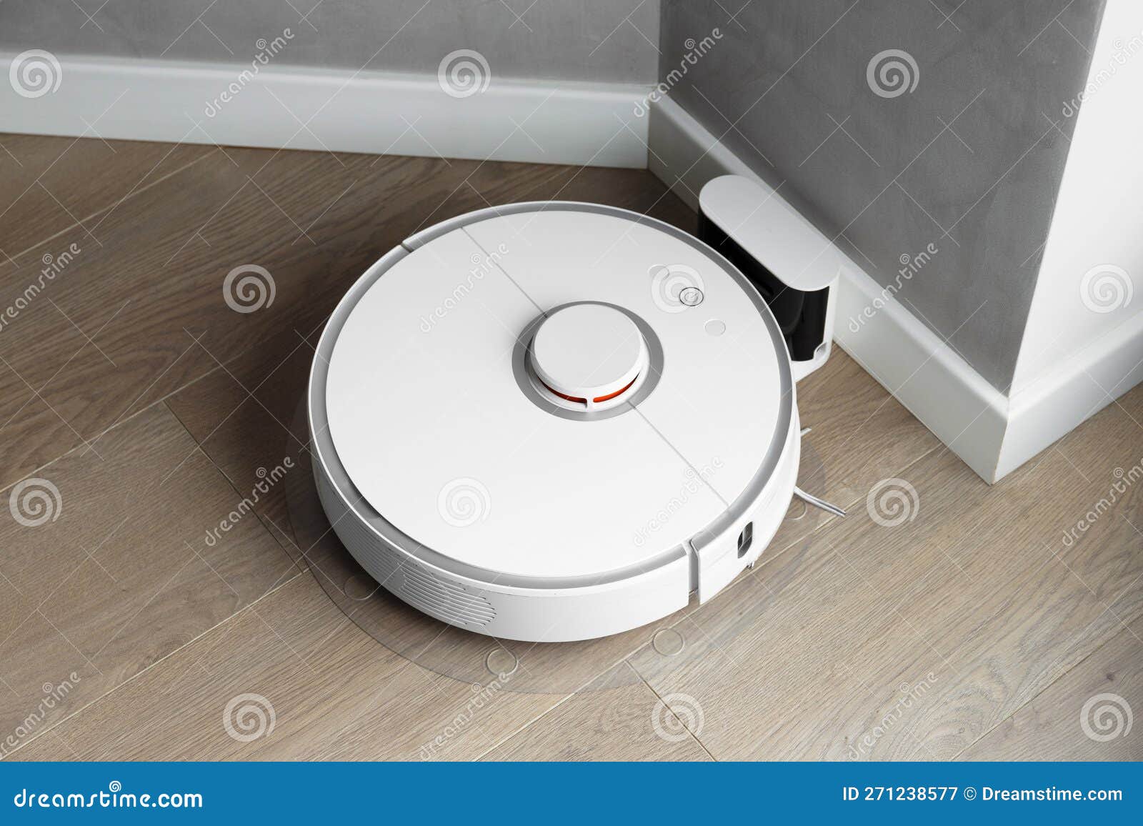 Robot Vacuum Cleaner Connected To Charging Station Stock Image - Image ...