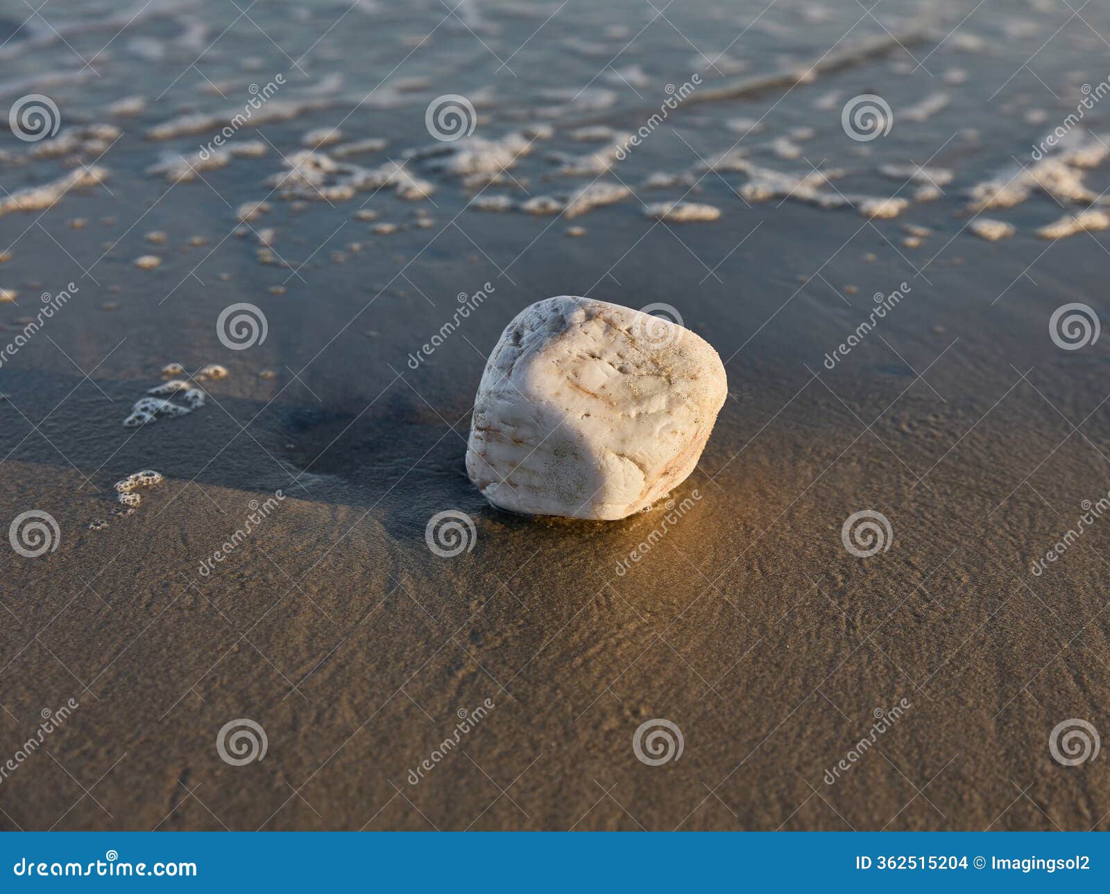 White Rock on the Sand after a Wave Stock Photo - Image of horizon ...