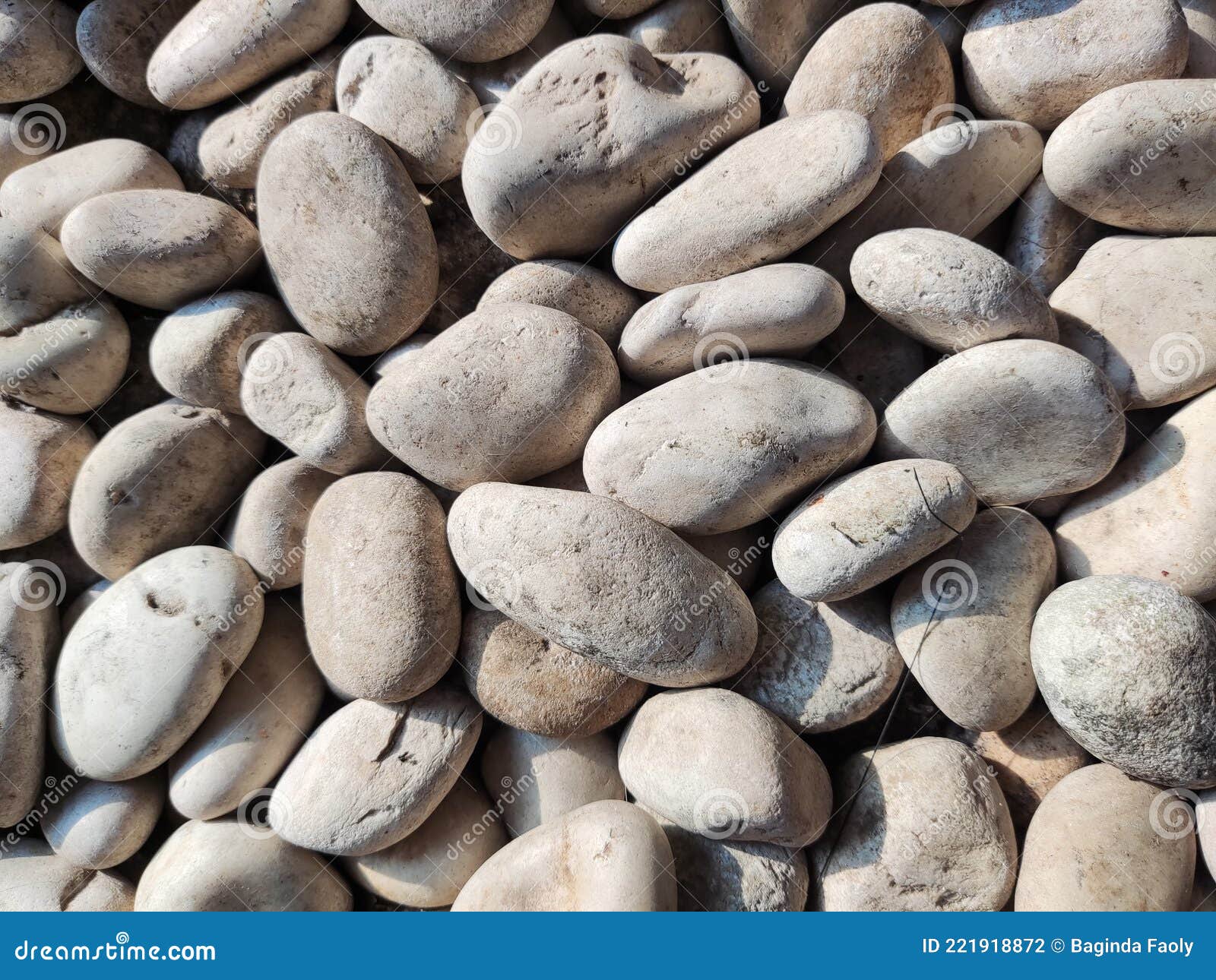 White rock in sunlight stock photo. Image of rubble - 221918872