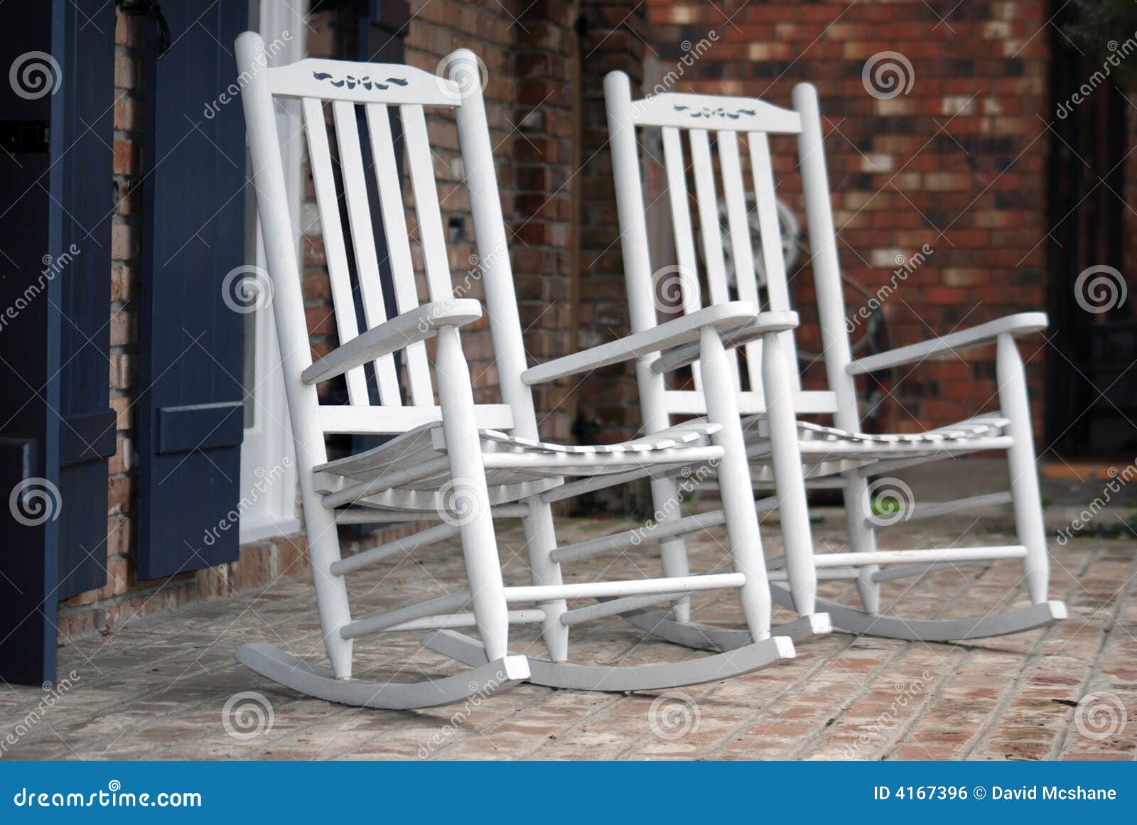 White Rocking Chairs stock photo. Image of fashioned, elders - 4167396