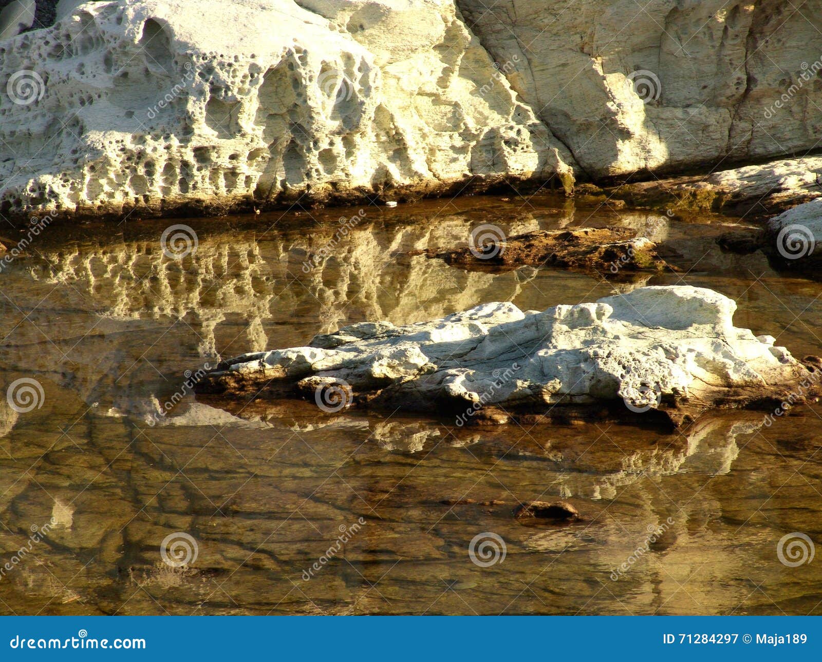 White Rocks Reflecting in the Water Stock Image - Image of light ...