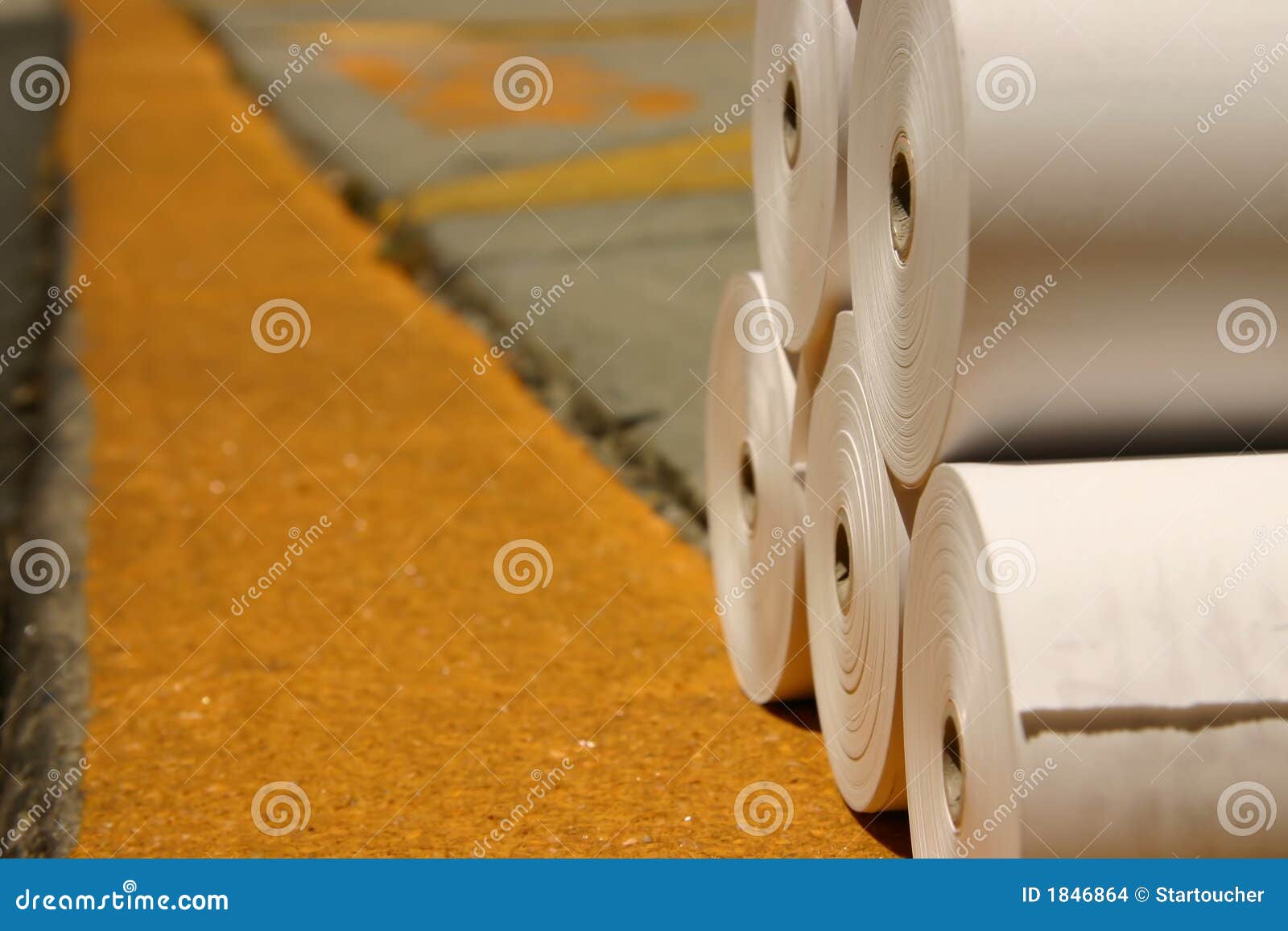 White Rolls of Printing Paper on a Loading Dock Stock Photo - Image of ...