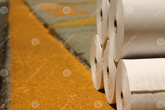 White Rolls of Printing Paper on a Loading Dock Stock Photo - Image of ...