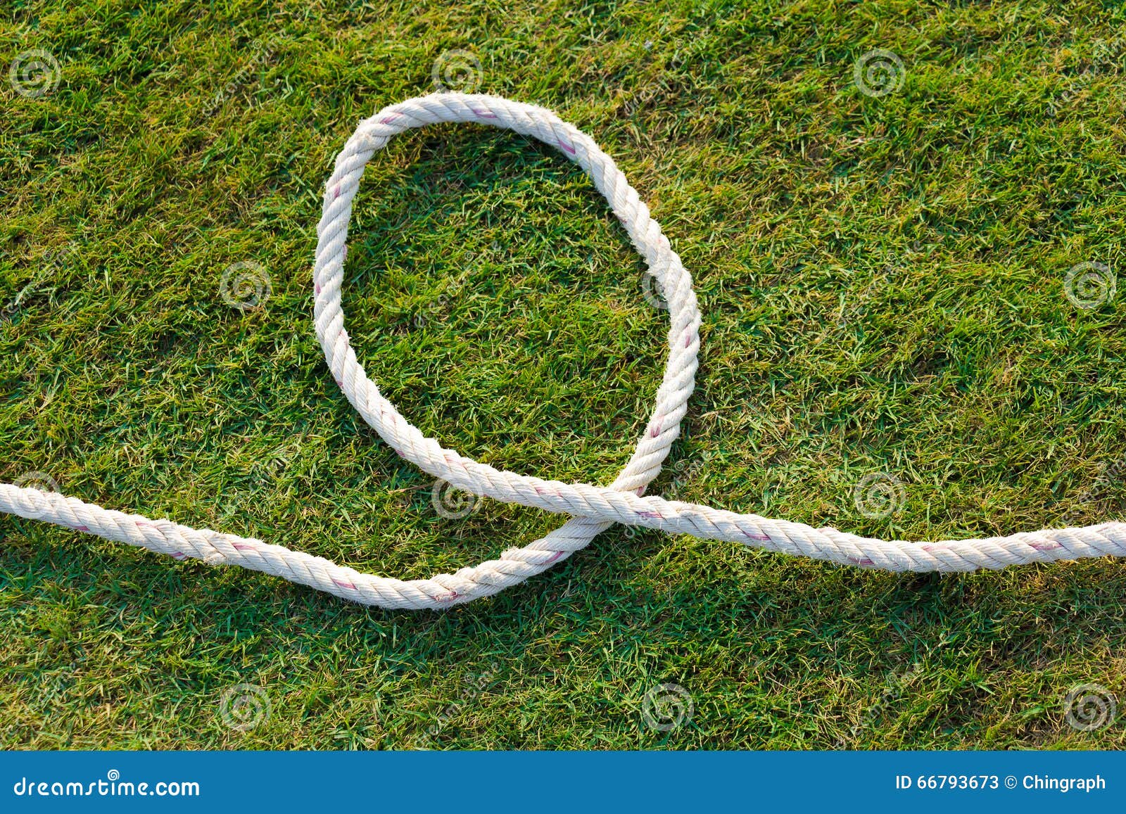 White rope on green lawn stock image. Image of rusty - 66793673