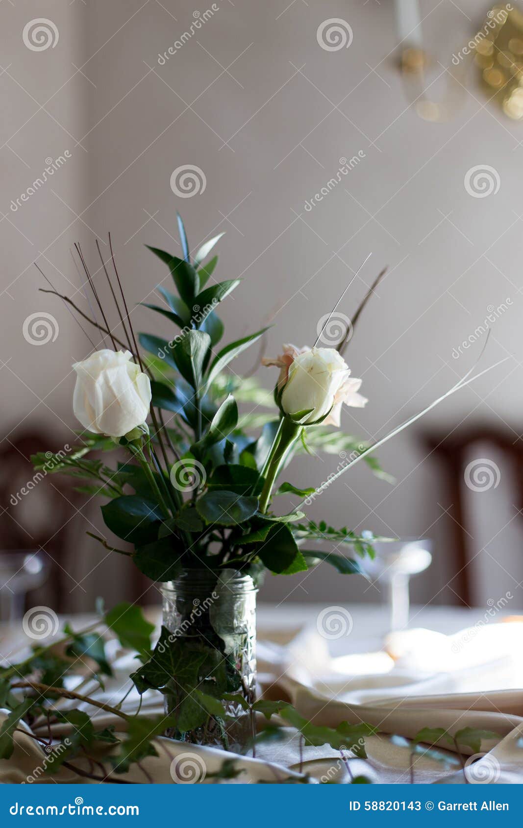 White Roses and Greenery in a Bouquet Stock Image - Image of greenery ...