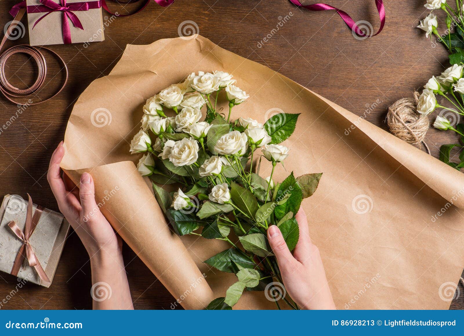 White roses in hands stock image. Image of beautiful - 86928213