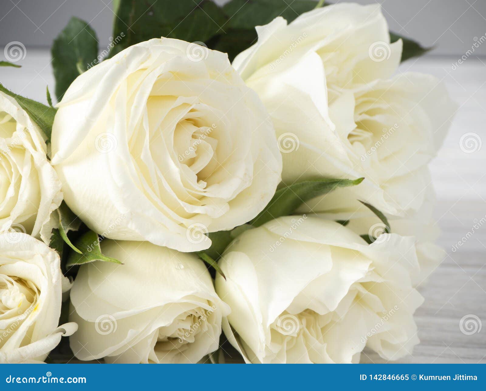 White Roses on a White Wooden Table Stock Image - Image of bridal ...