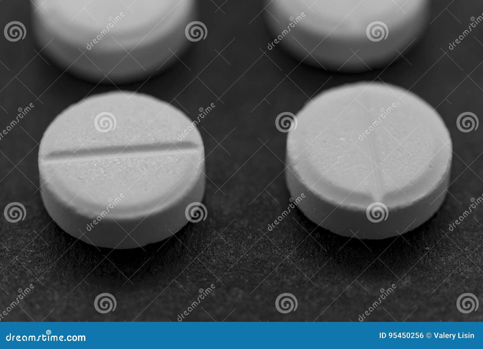 White round pills in row stock photo. Image of healthy - 95450256