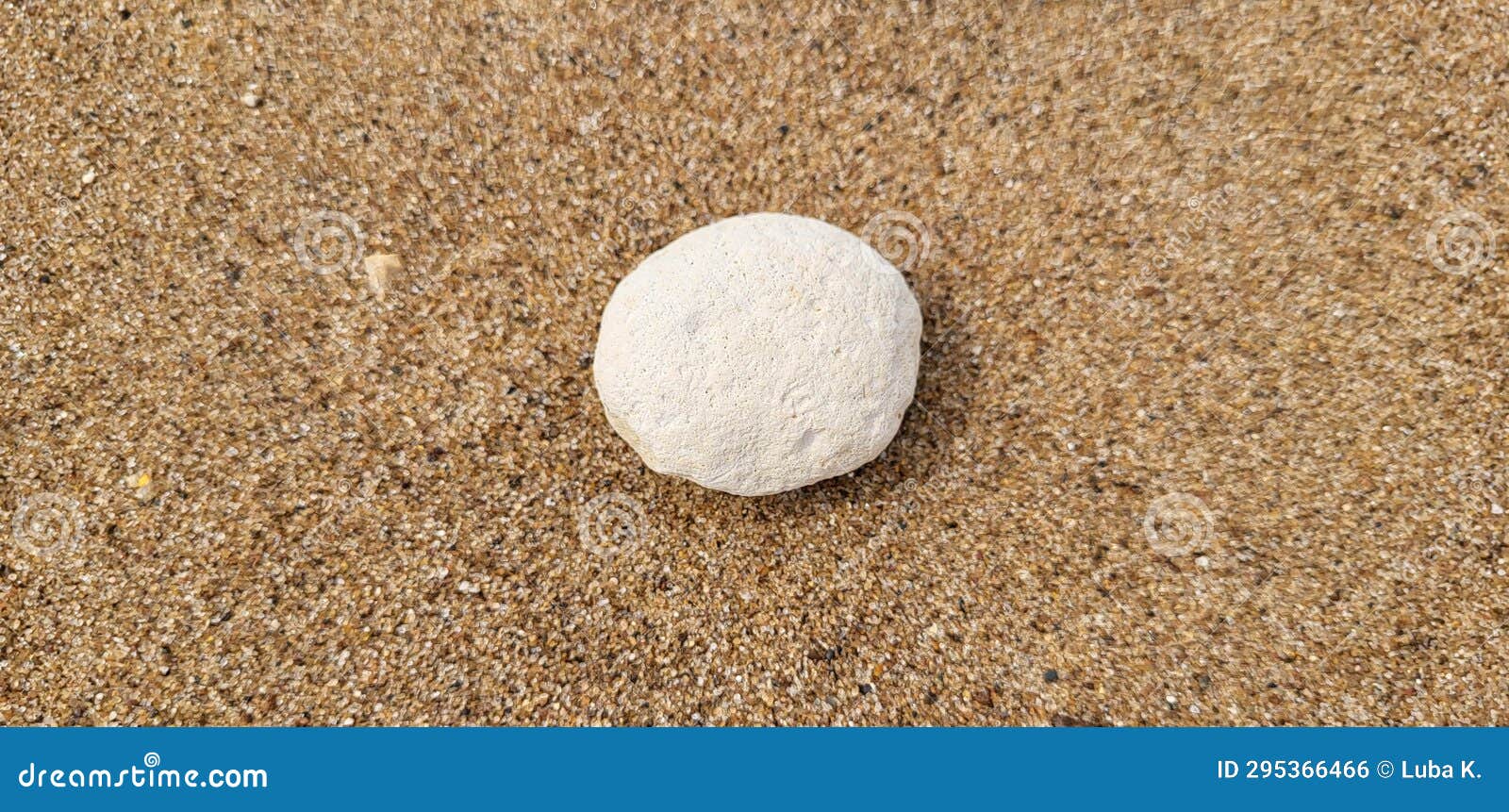 White Round Stone on the River Sand on the Beach Stock Photo - Image of ...